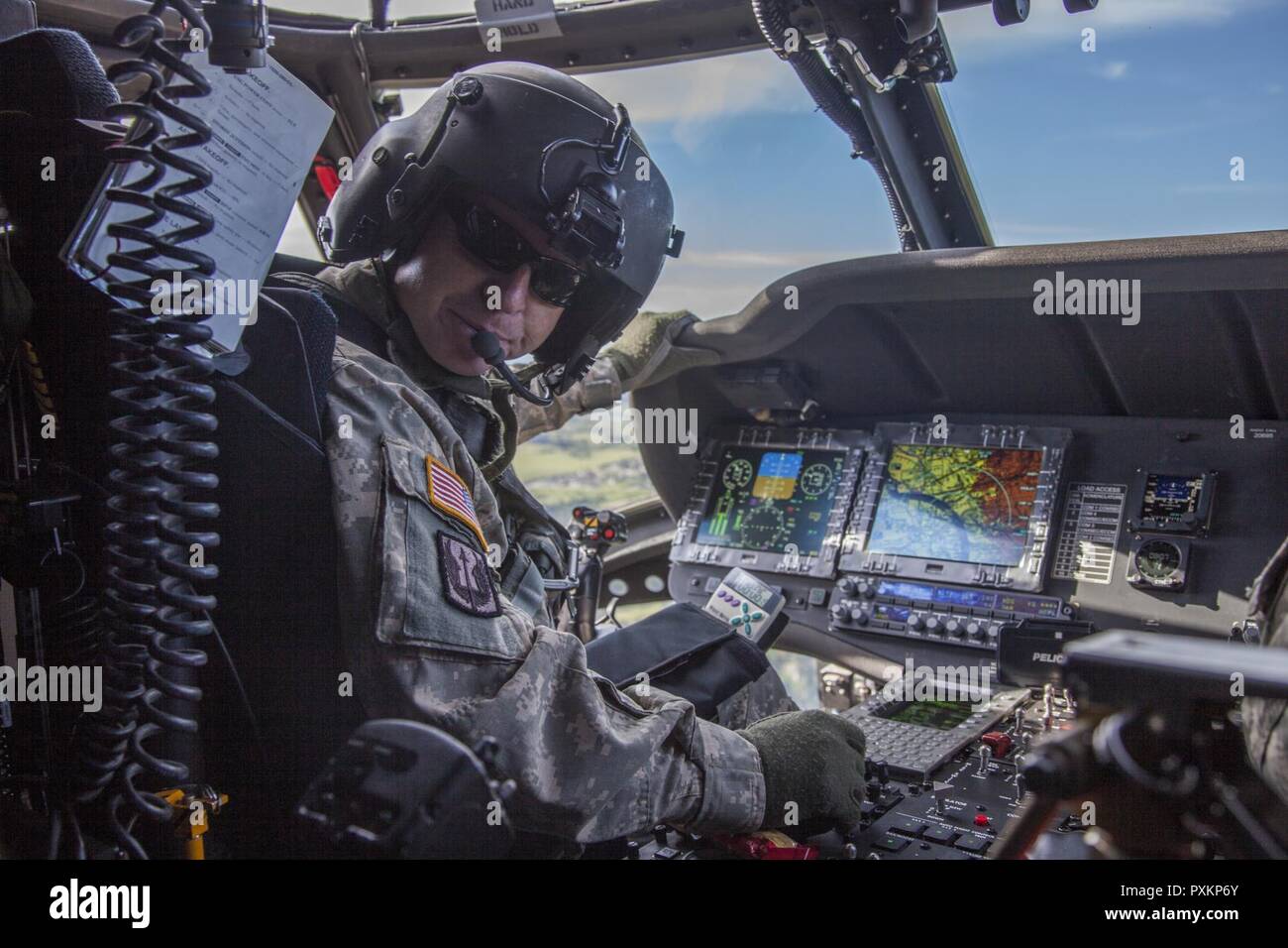 A HH-60M MEDEVAC Black Hawk pilot with Joint Force Headquarters, South ...