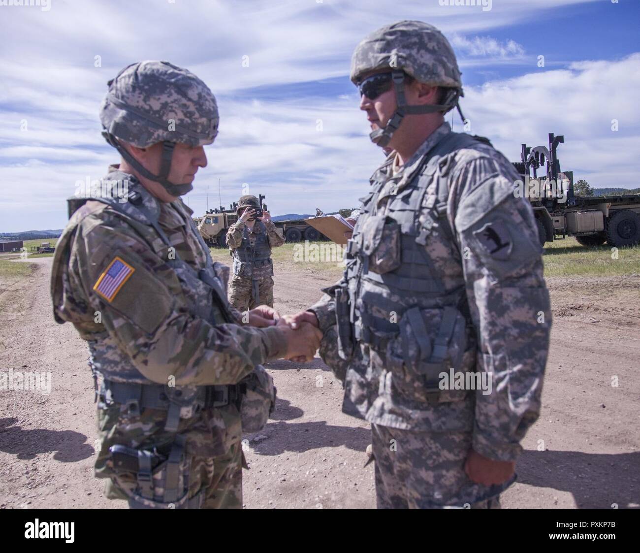 U.S. Army Maj. Gen. Timothy Reisch (left) The Adjutant General, South ...