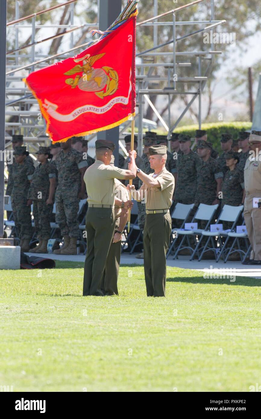 U.S. Marine Col. James R. Hensein returns the regimental colors to Sgt ...