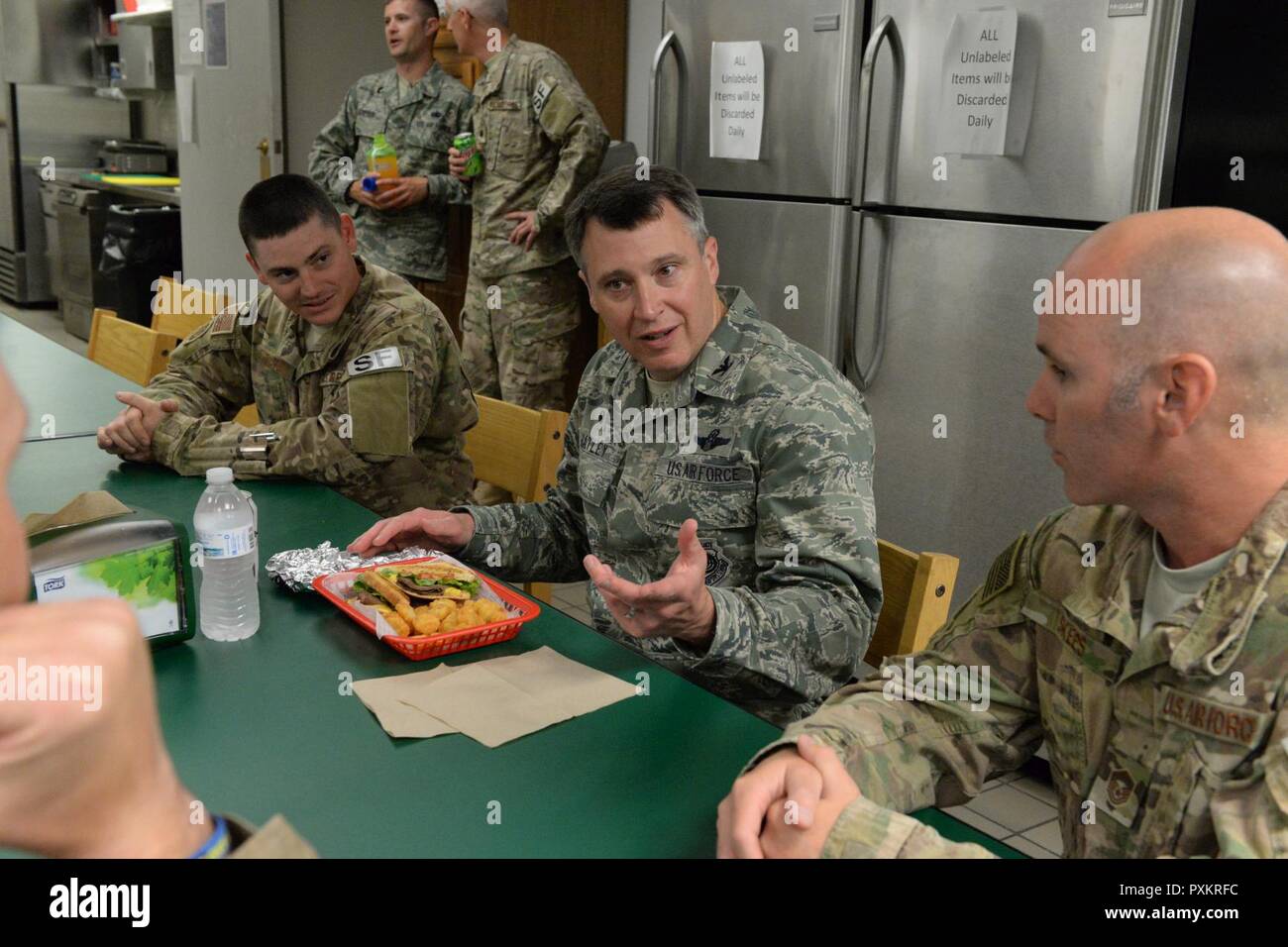 U.S. Air Force Col. Britt Hatley, the 119th Wing commander, center ...
