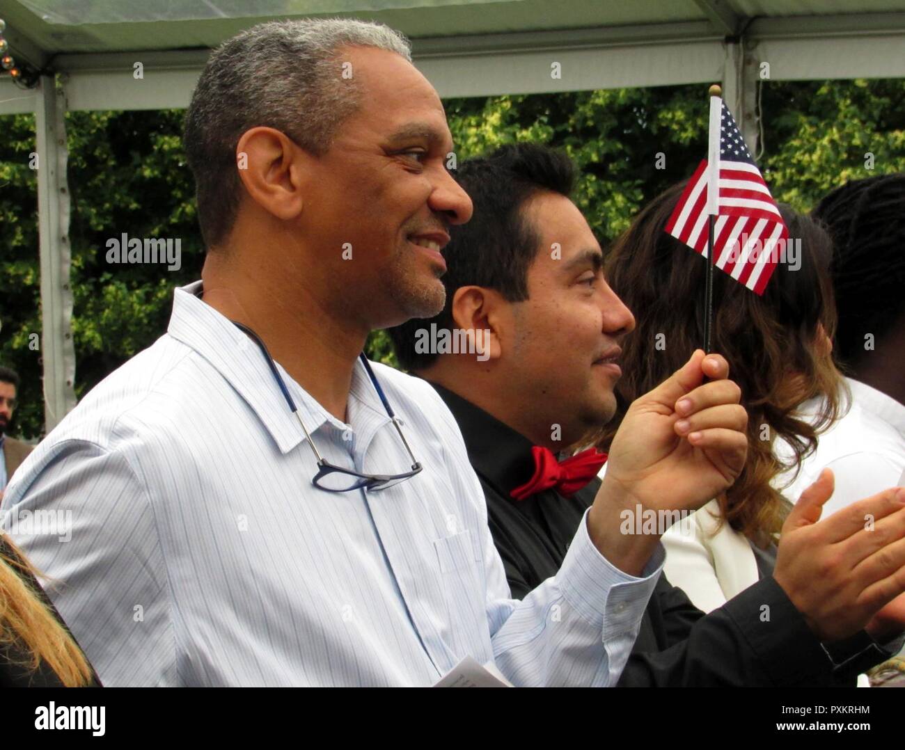 Newly naturalized citizens of the United States cheer during a U.S ...