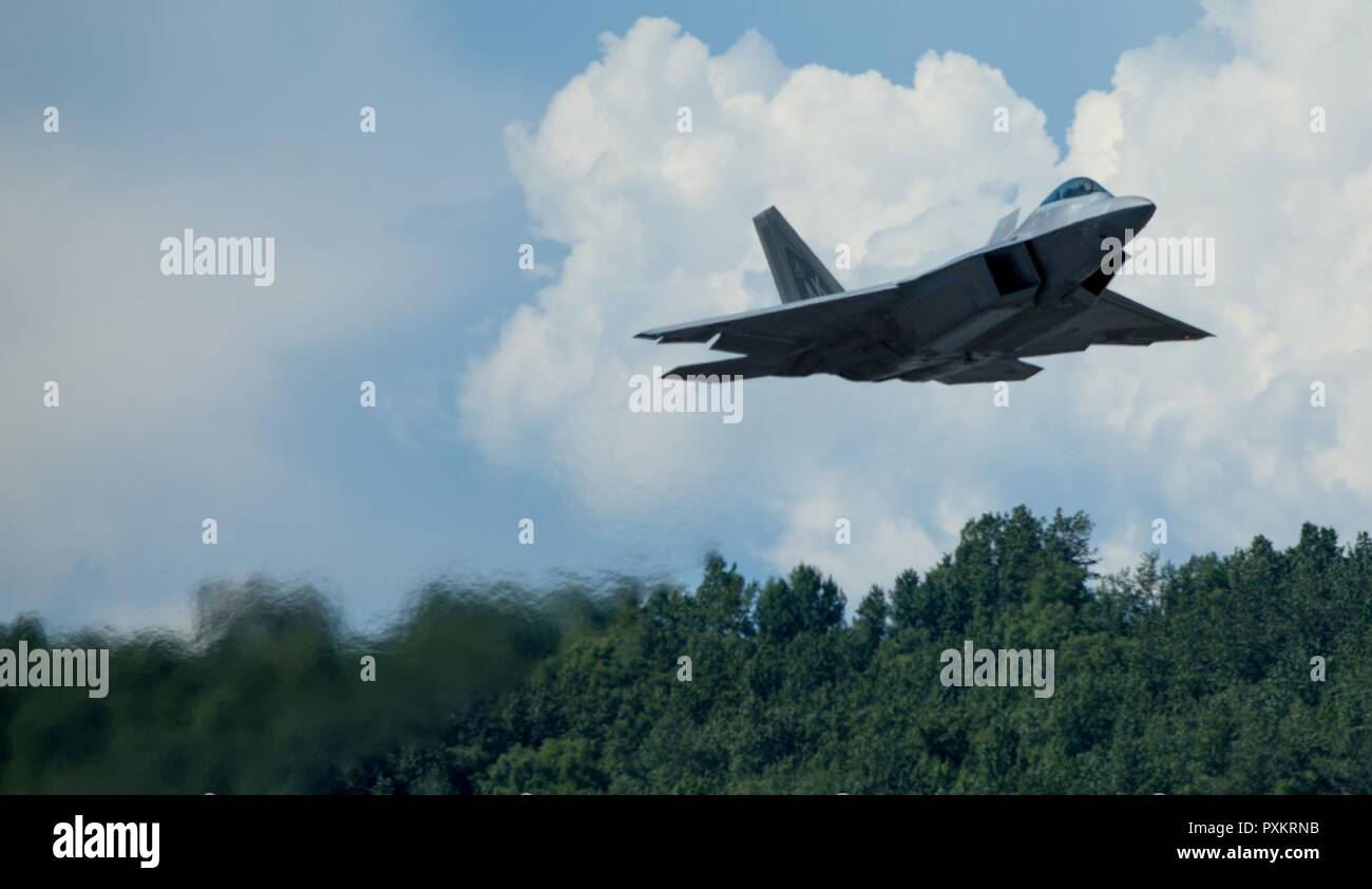 A U.S. Air Force F-22 Raptor takes off from a flightline during Red ...