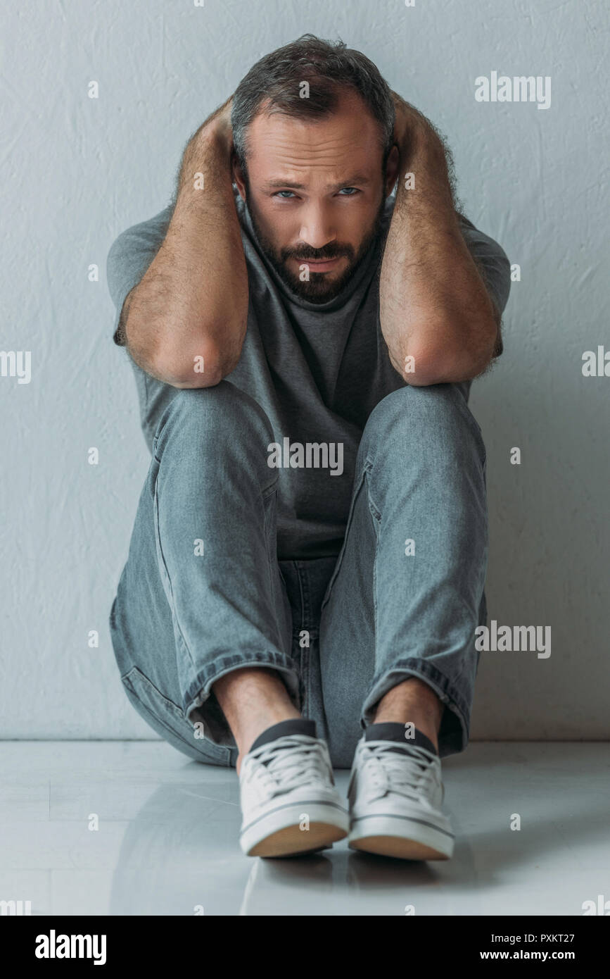 Terrified Man Looking Down