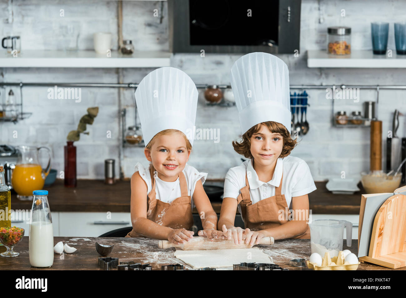 Happy female chef kids hi-res stock photography and images - Alamy