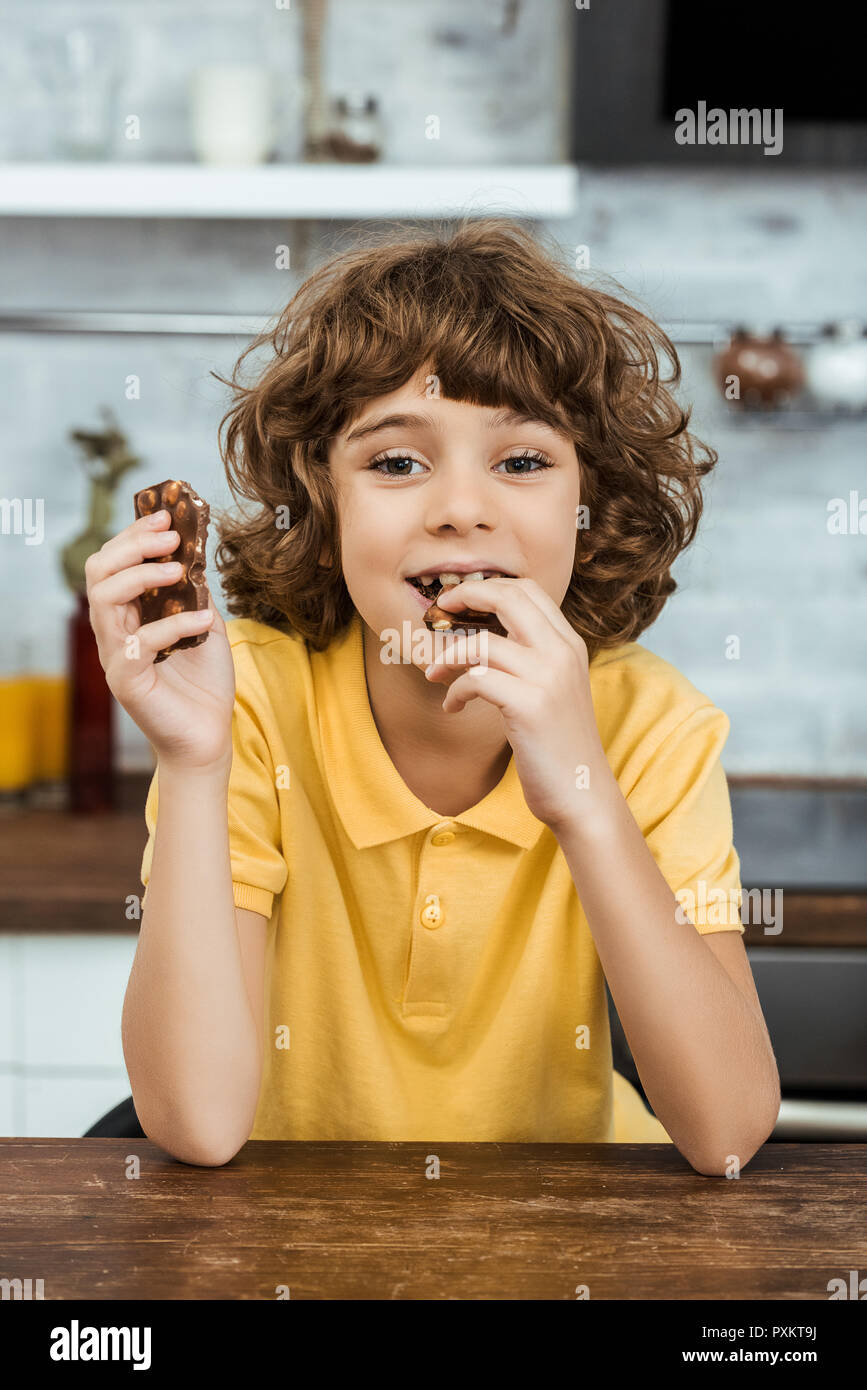 Cute boy eating delicious hi-res stock photography and images - Alamy