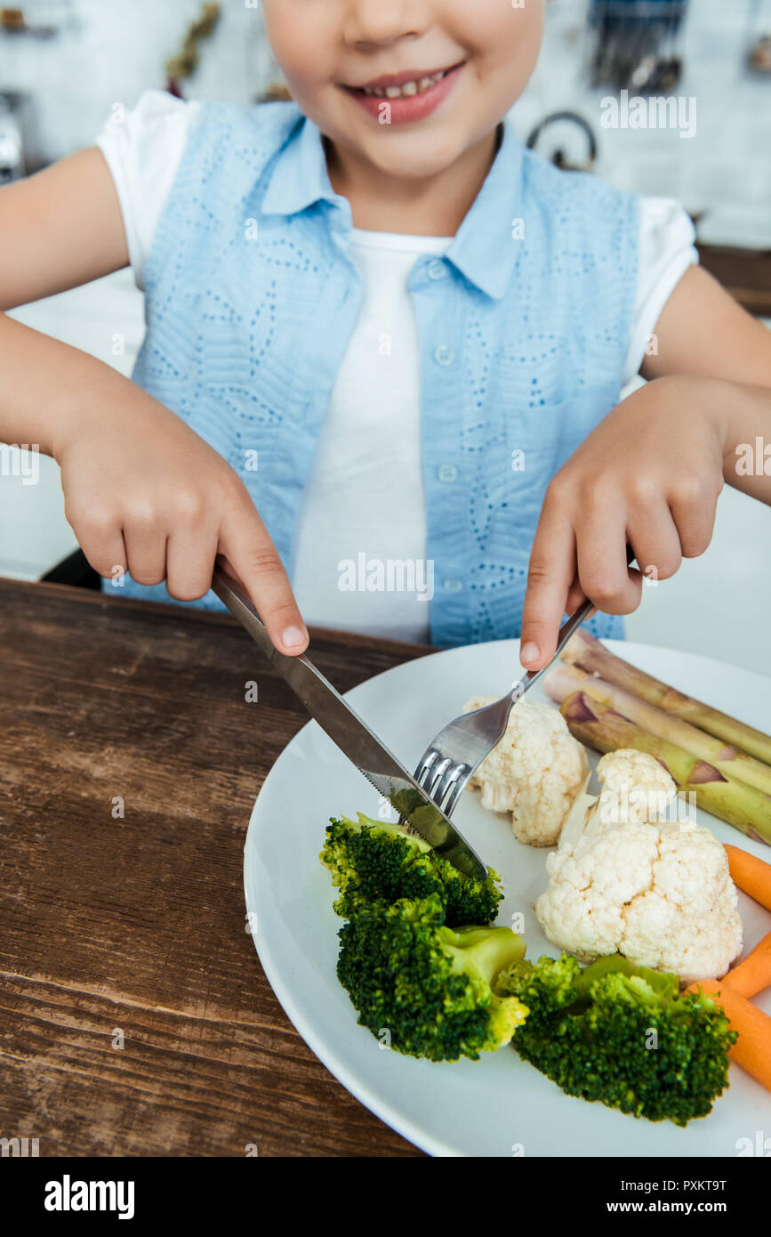 Child broccoli and cauliflower hi-res stock photography and images - Alamy