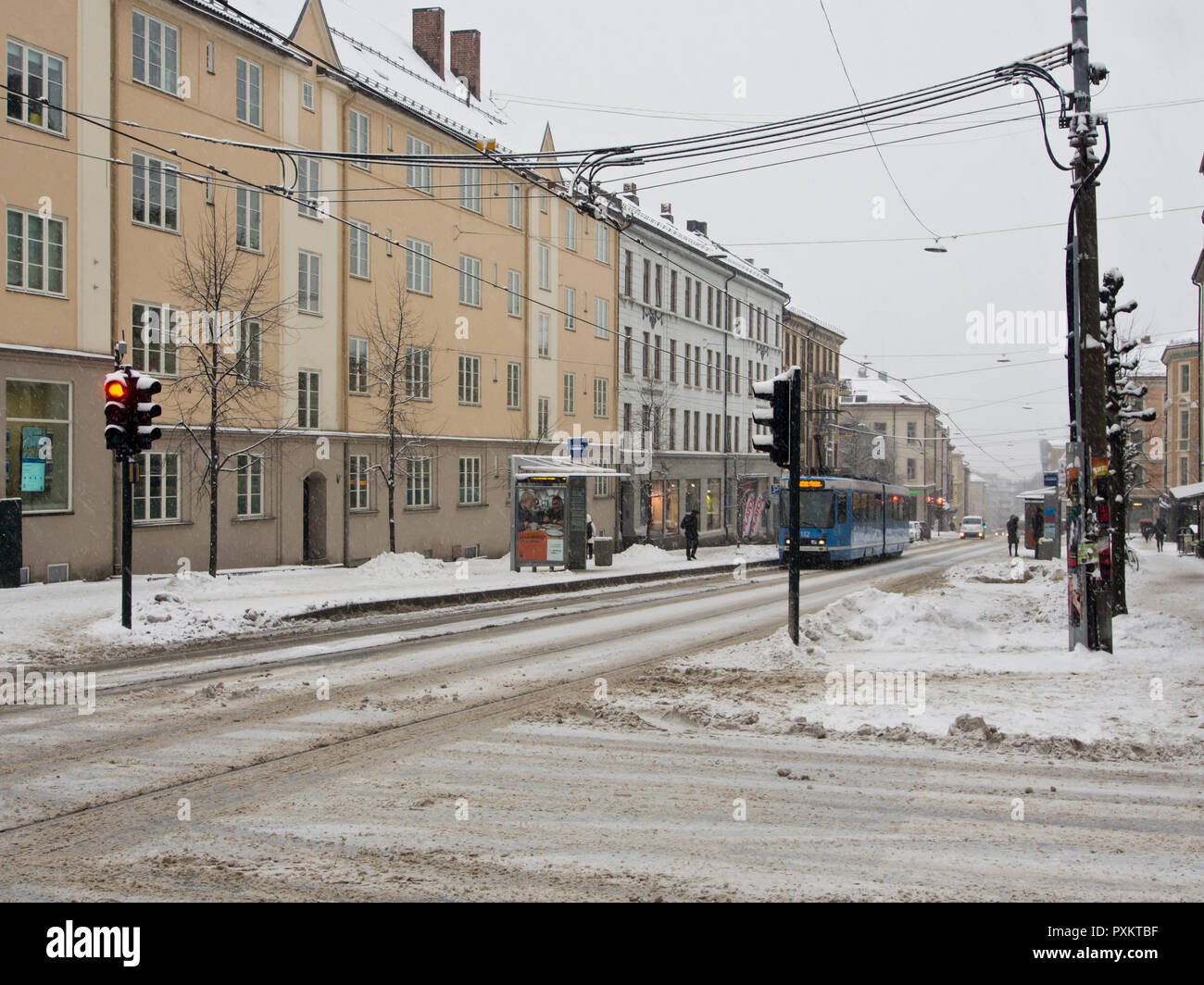 Winter and snow, street scene with tram in Vogts gate in the popular ...