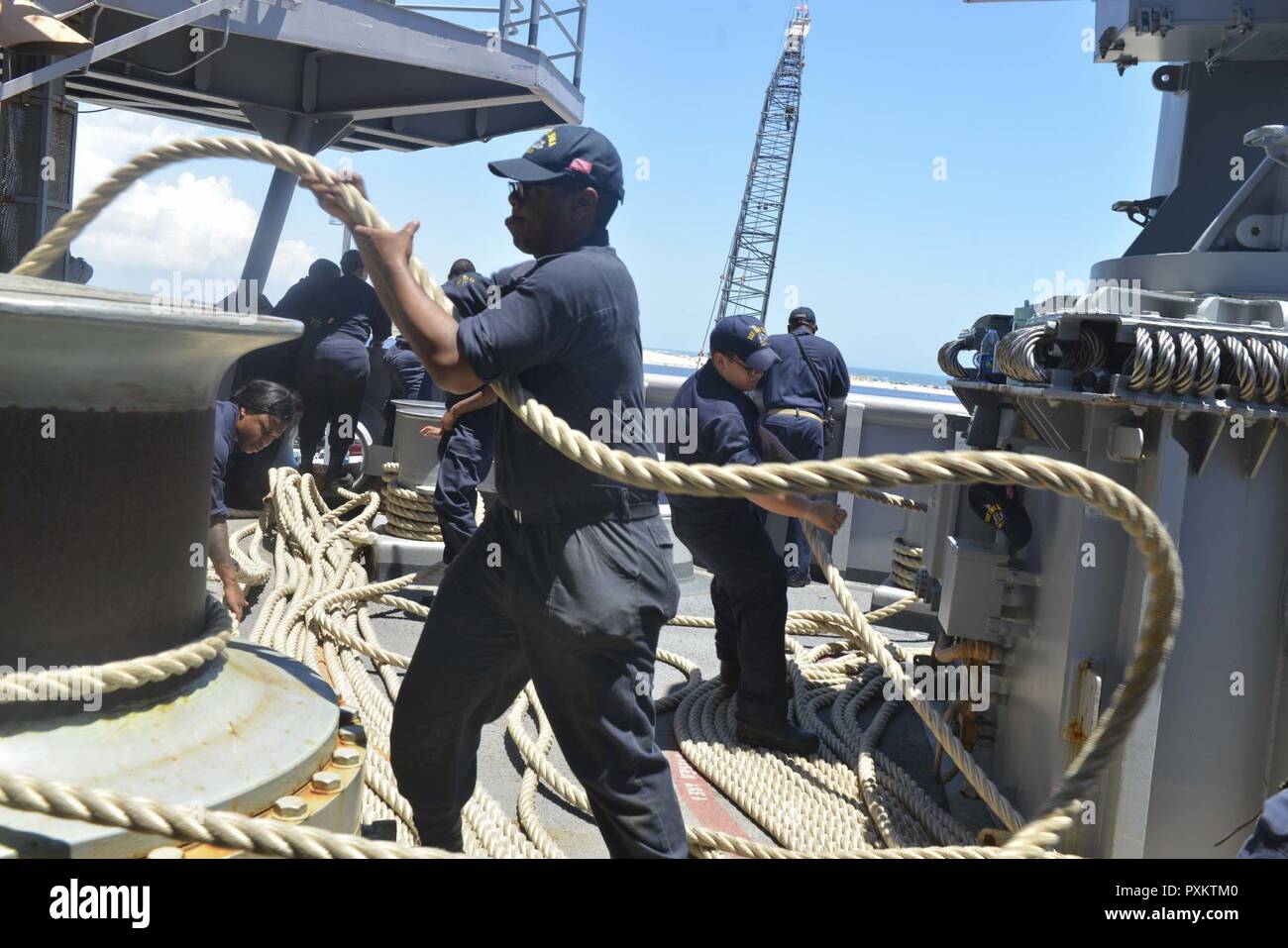 MAYPORT, FL (June 18, 2017) – Seaman Bobby Branch slacks out a mooring ...