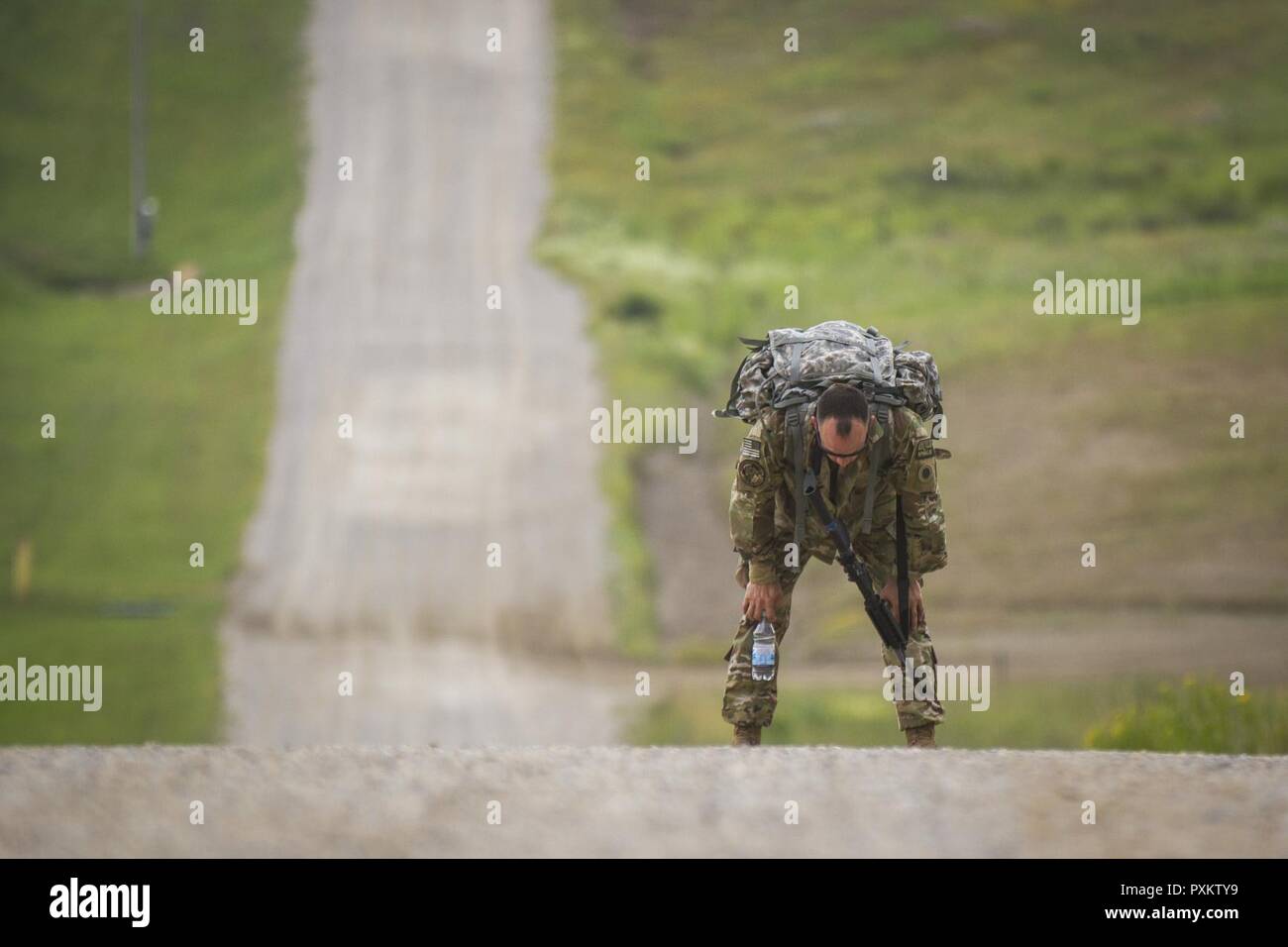 A U.S. Army Soldier, assigned to Multinational Battle Group-East takes ...