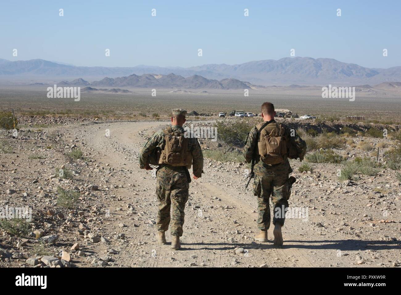 055- Major Christopher Polidora, an inspector instructor (left) and ...