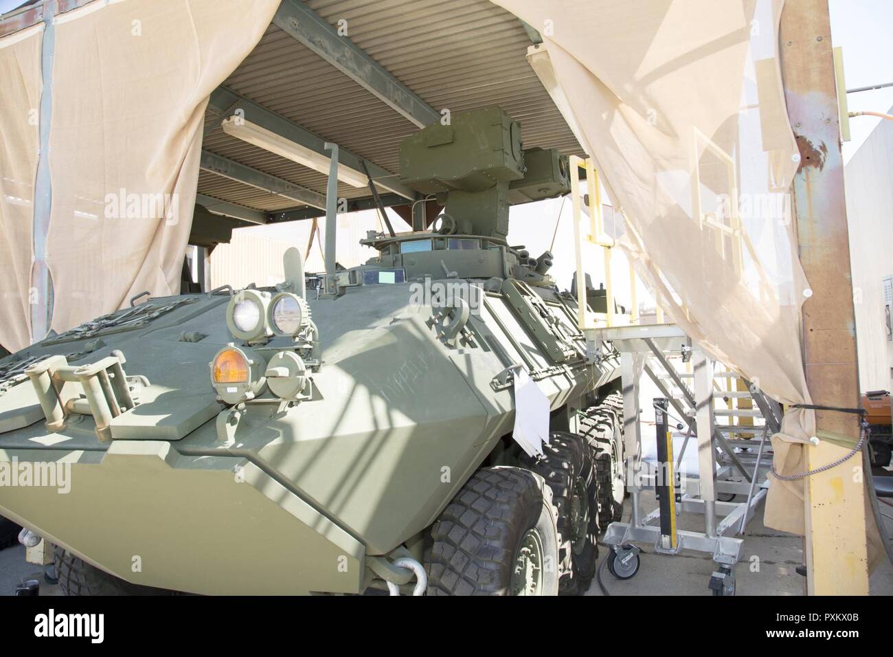 A Light Armored Vehicle Anti-Tank Modernization A2 model sits under an ...