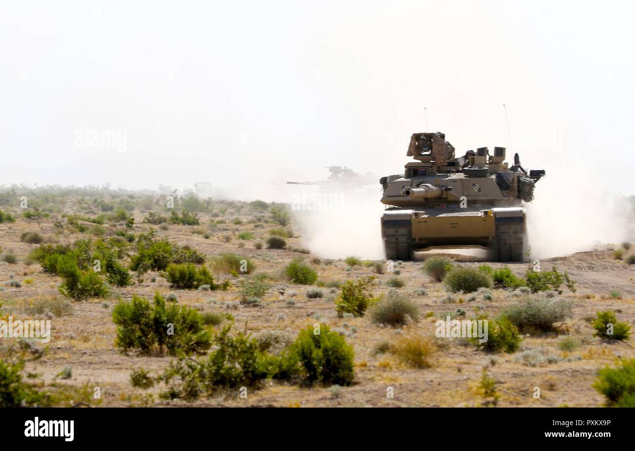 M1A2 SEPv2 Abrams tanks with Company C, 1st Battalion, 155th Infantry ...
