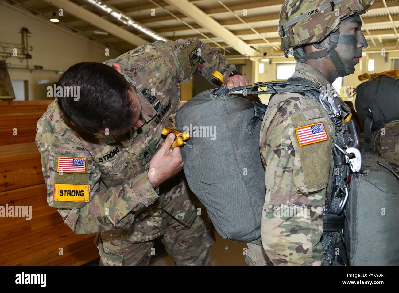 U.S. Army Staff Sgt. Carroll Strong, a jumpmaster assigned to the ...