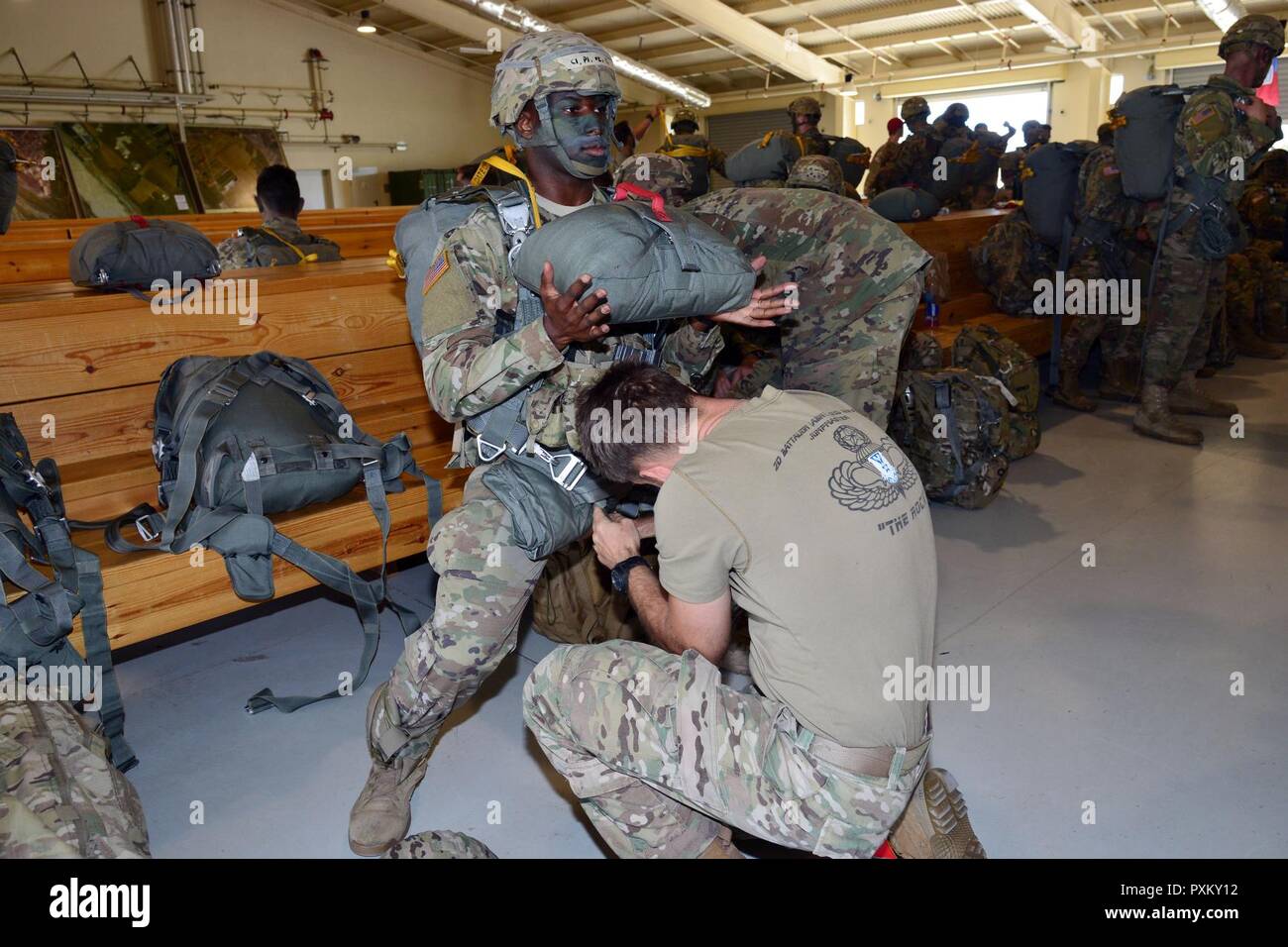 U.S. Army Staff Sgt. Joshua Van Horn, a jumpmaster assigned to the 2nd ...