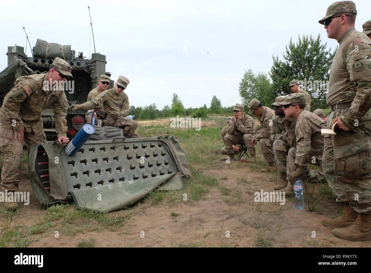 Battle Group Poland U.S. combat engineers are taught how to load and ...