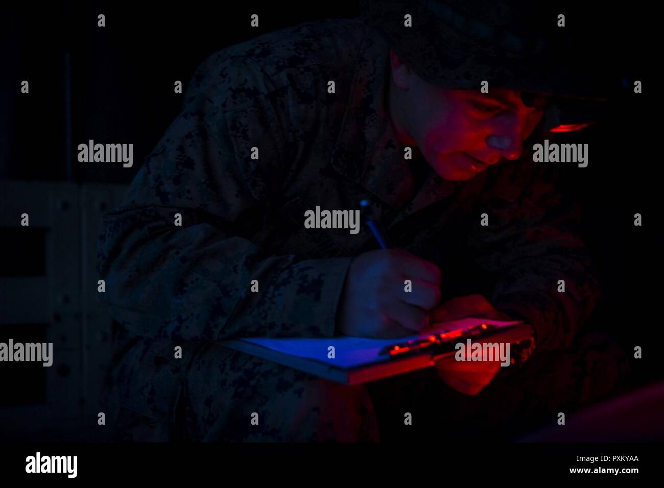 A U.S. Marine with Black Sea Rotational Force 17.1 sets up the fire ...