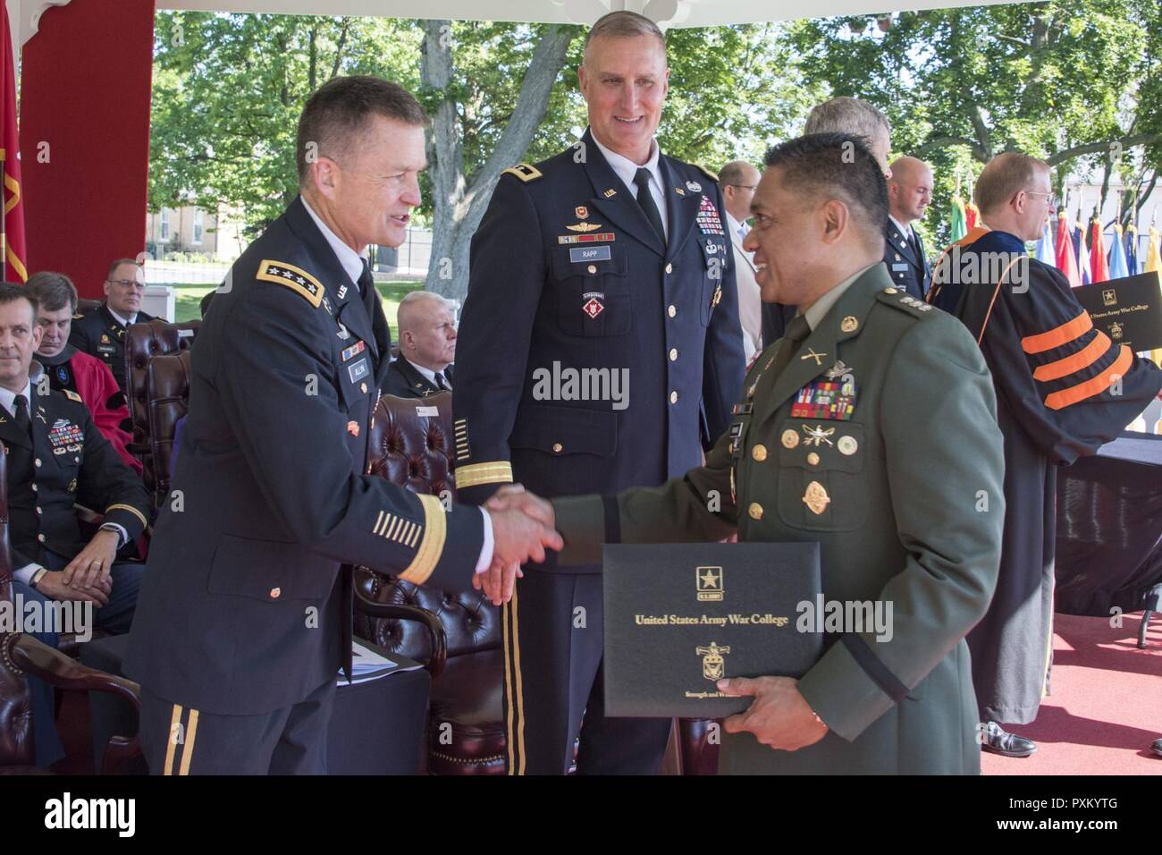 Col. Romeo S. Brawner of the Philippines accepts his Army War College ...