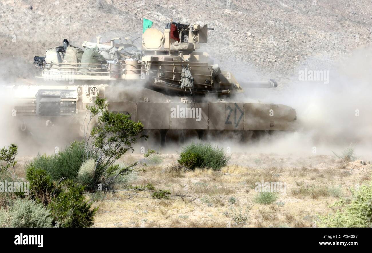 An Abrams tank with 2d Battalion, 198th Armored Regiment, fires a 120 ...