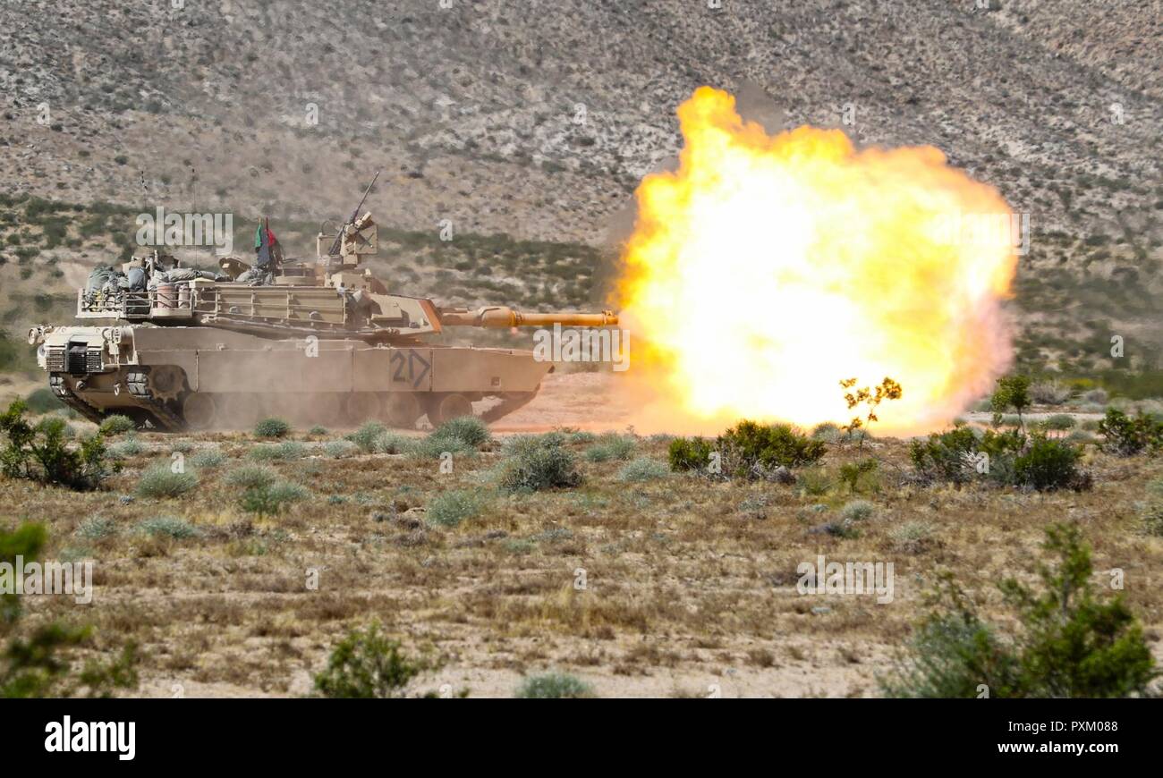 An Abrams tank with 2d Battalion, 198th Armored Regiment, fires a 120 ...