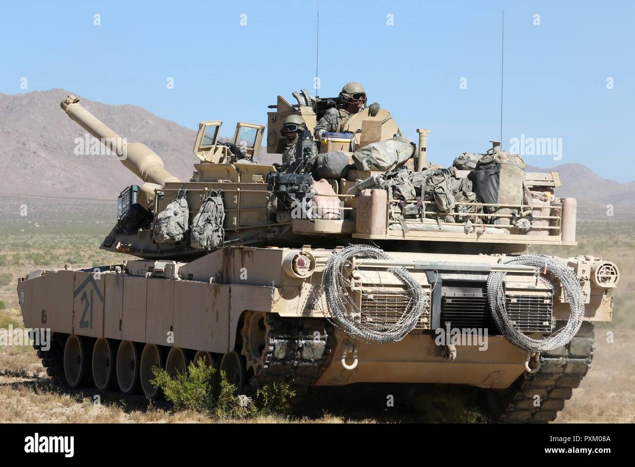 Soldiers with 2d Battalion, 198th Armored Regiment, manuever an Abrams ...