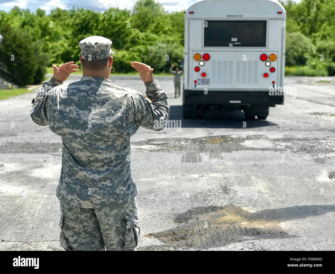 Spc. Luis Virola, a light wheeled vehicle mechanic with the ...