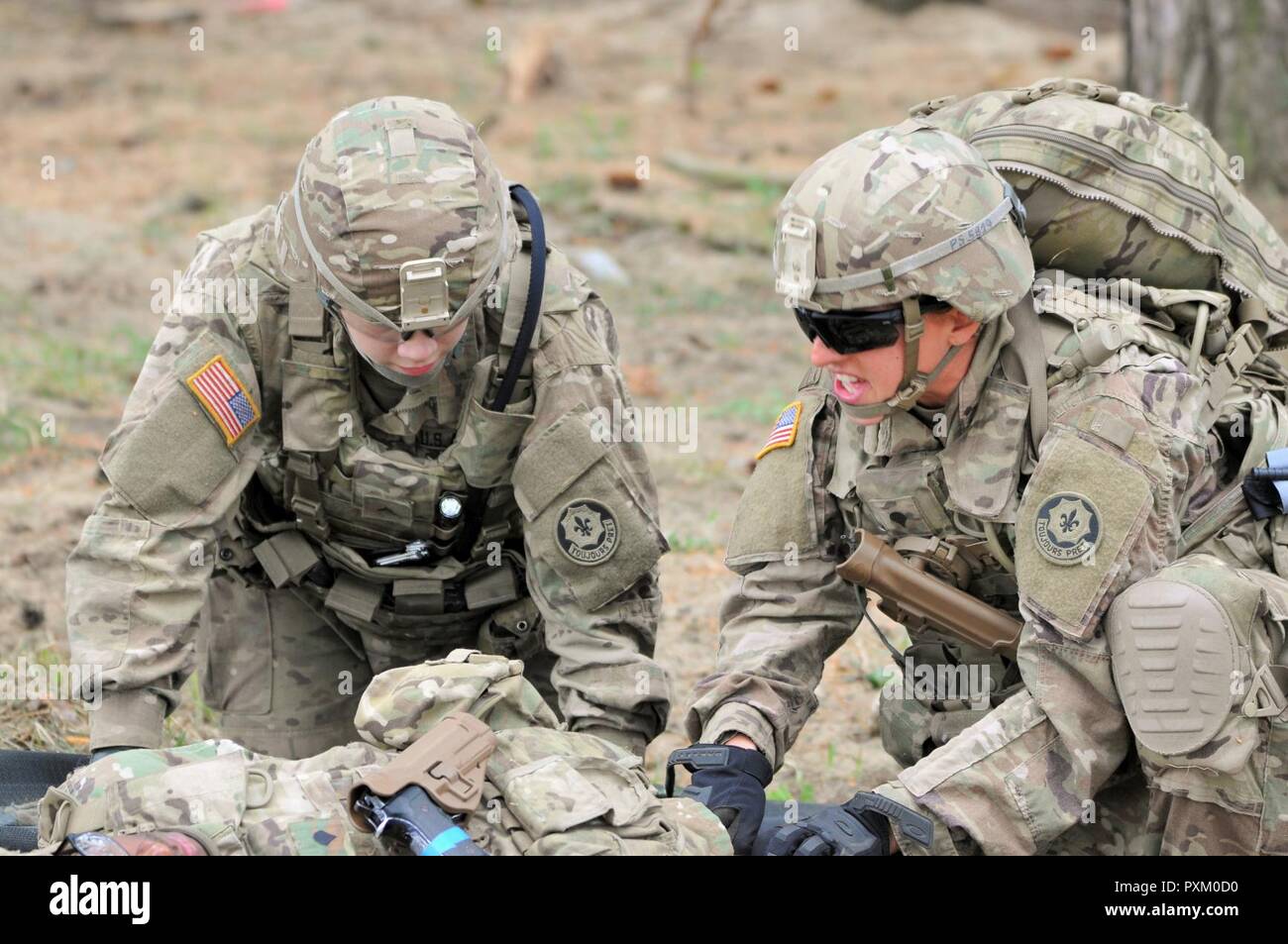 Battle Group Poland U.S. Soldiers practice a variety of combat casualty ...
