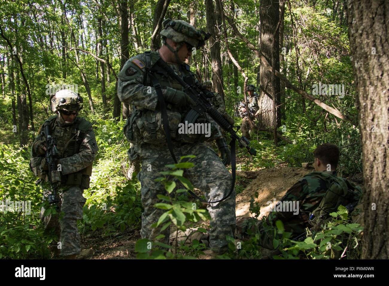 Infantrymen with the 2nd Battalion, 130th Infantry Regiment, 33rd ...