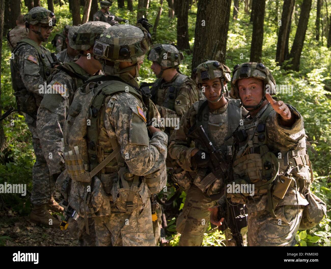 Right: An infantry squad leader with the 2nd Battalion, 130th Infantry ...