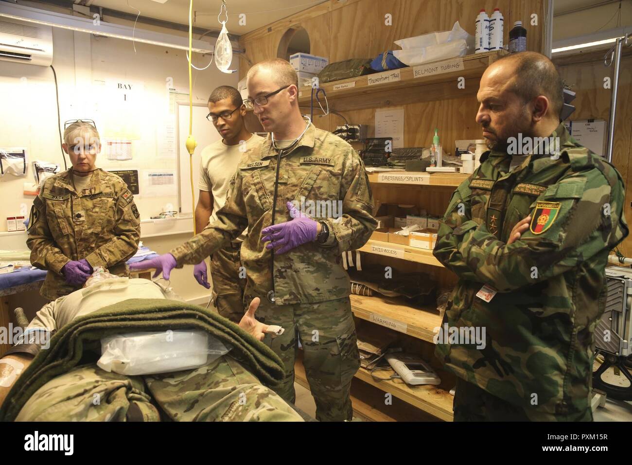 A U.S. Army trauma surgeon with 2nd Forward Surgical Team, U.S. Forces ...