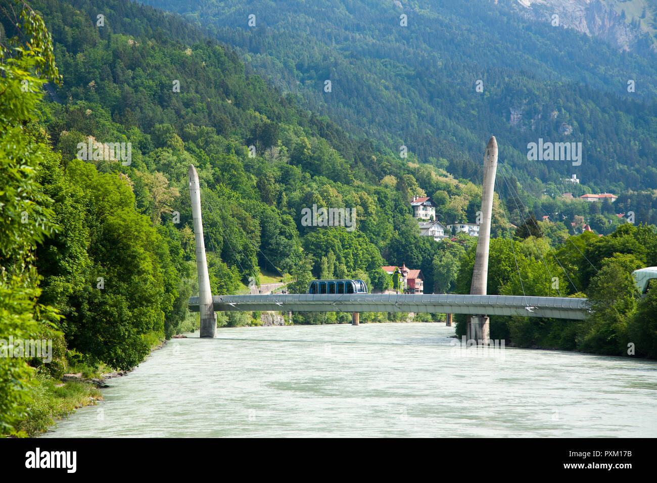 Innsbruck city center view. Funicular bridge over Inn river Stock Photo ...