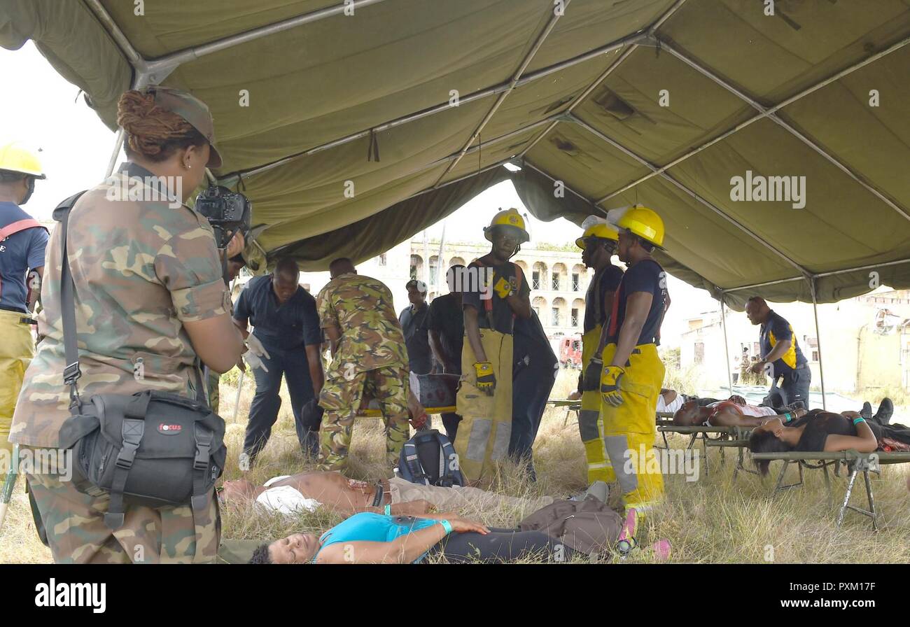 A Barbados Defence Force (BDF) photographer records the action at a ...