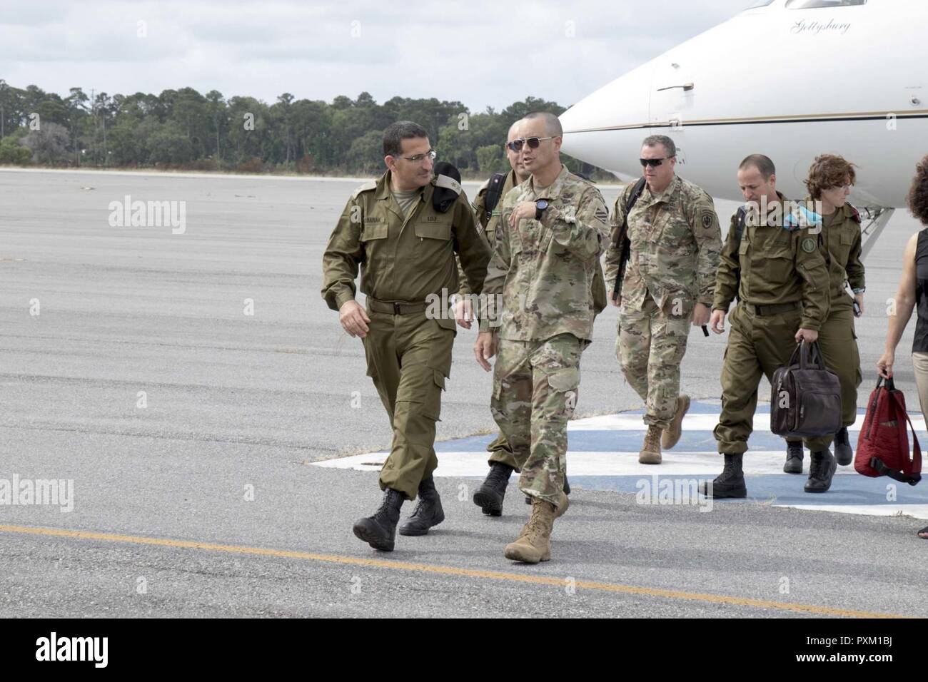 Maj. Gen. Leopoldo Quintas, 3rd Infantry Division commander, greets Maj ... Maj. Gen. Leopoldo Quintas, 3rd Infantry Division commander, greets Maj ...