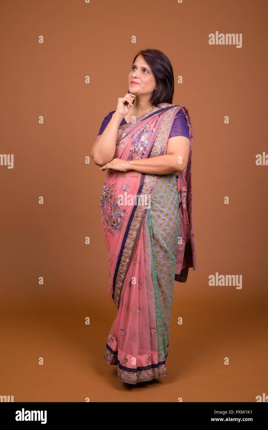 Full body shot of Indian woman wearing Sari Indian traditional clothes ...