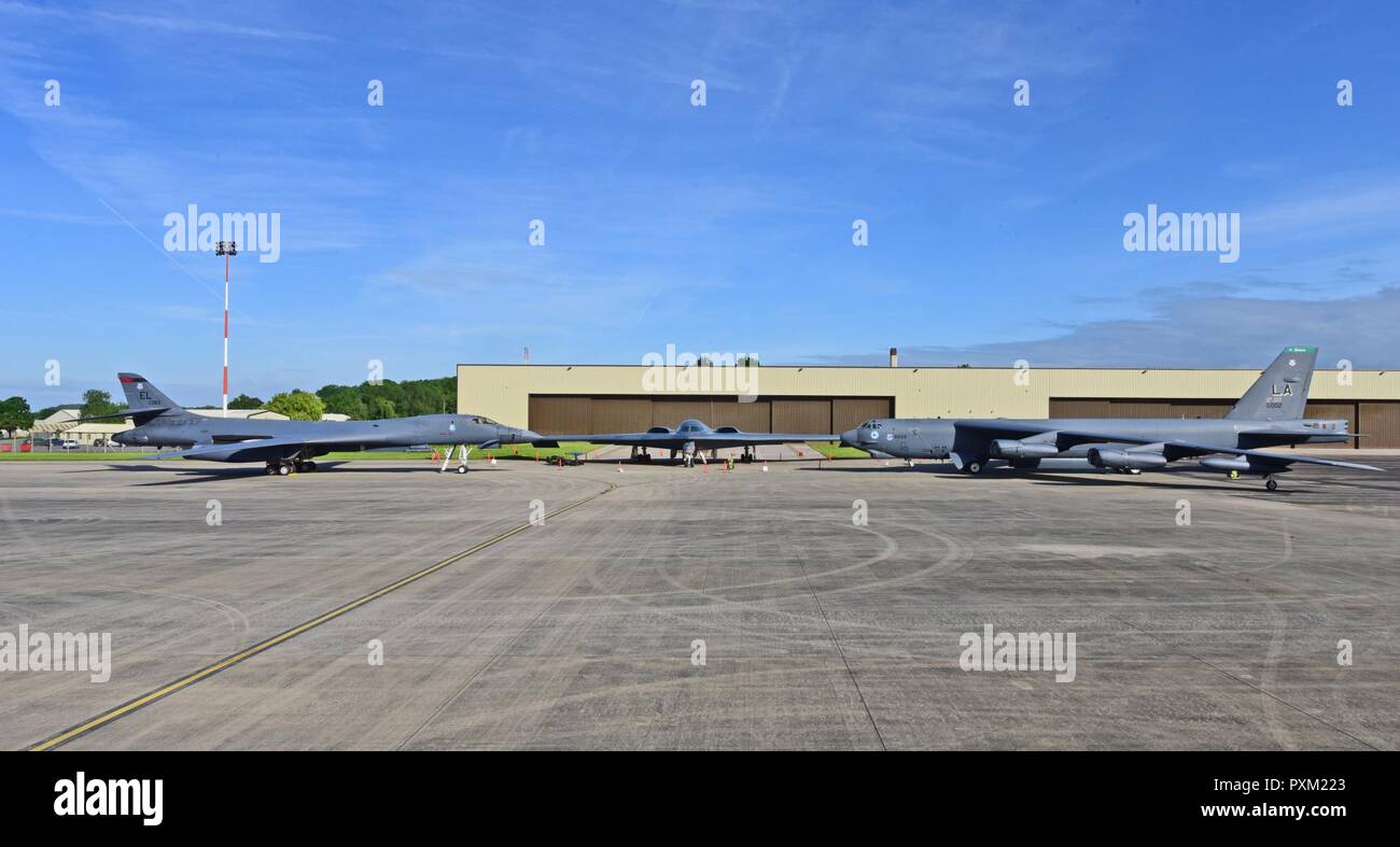 A B-1B Lancer, B-2 Spirit and B-52 Stratofortress are parked on the ...