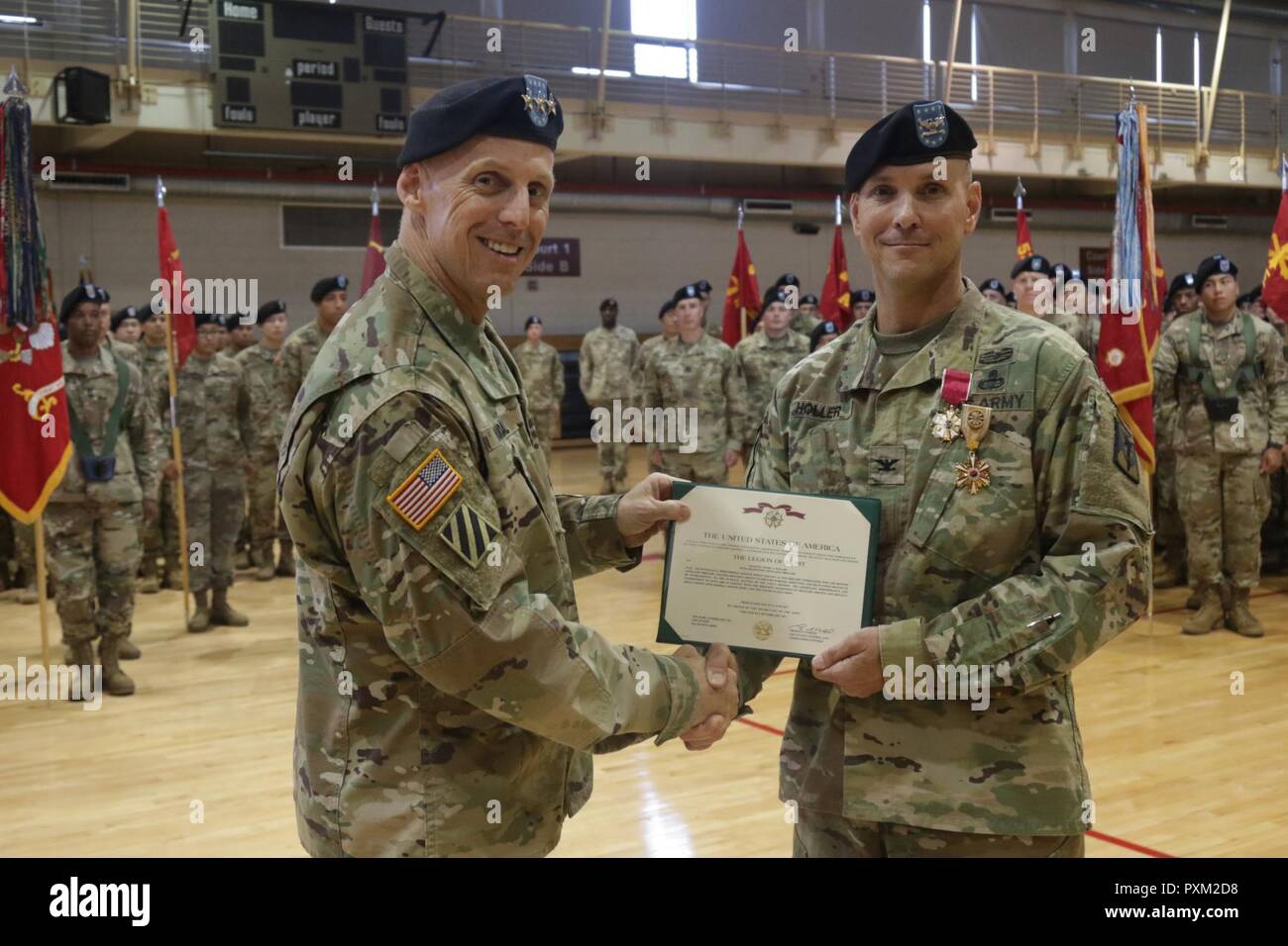 Lt. Gen. Thomas Vandal, Eighth Army commanding general, presents Col ...