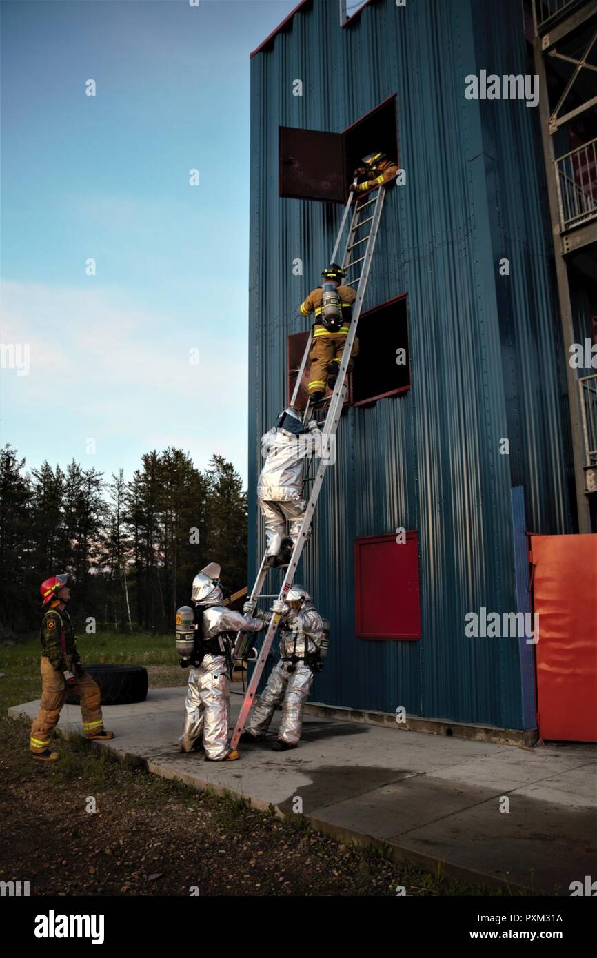 Royal Canadian Air Force firefighters with 4 Wing Fire Service, Armed ...