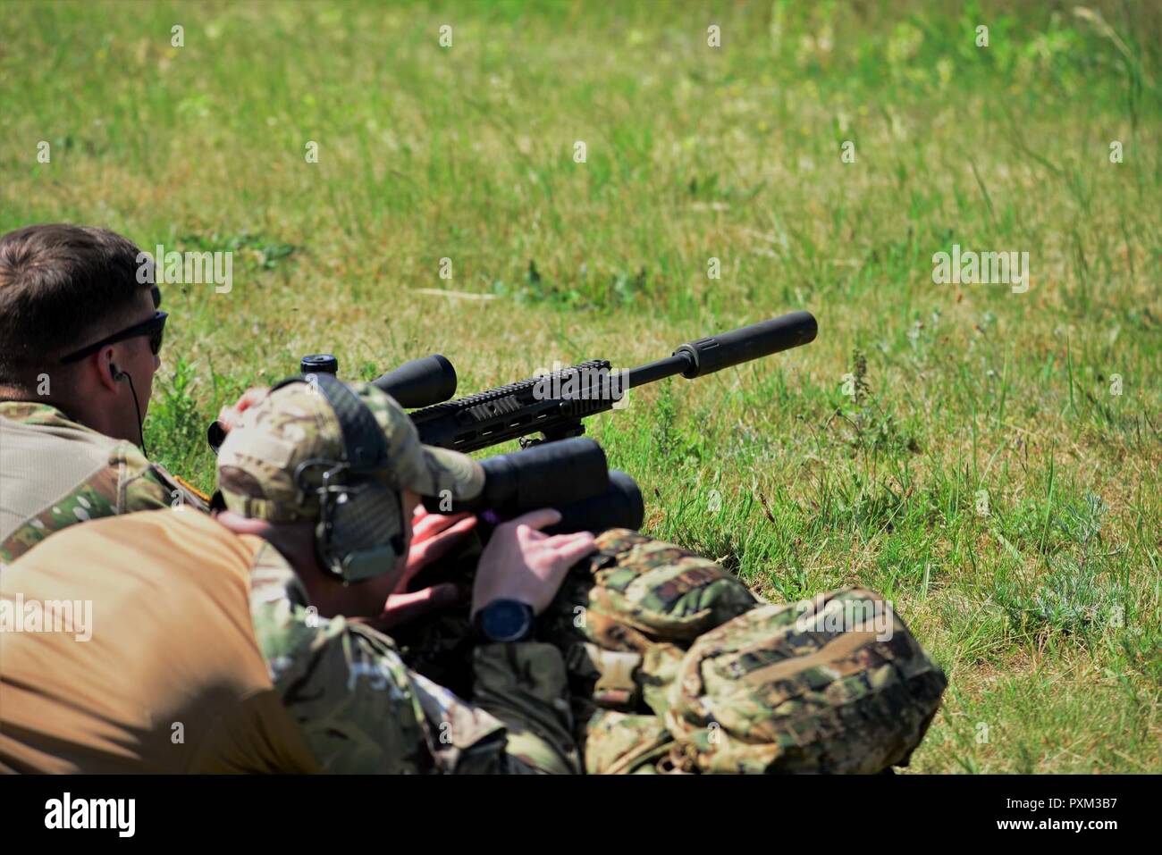 Battle Group Poland U.S. and UK Soldiers fire the M2010 Enhanced Sniper ...