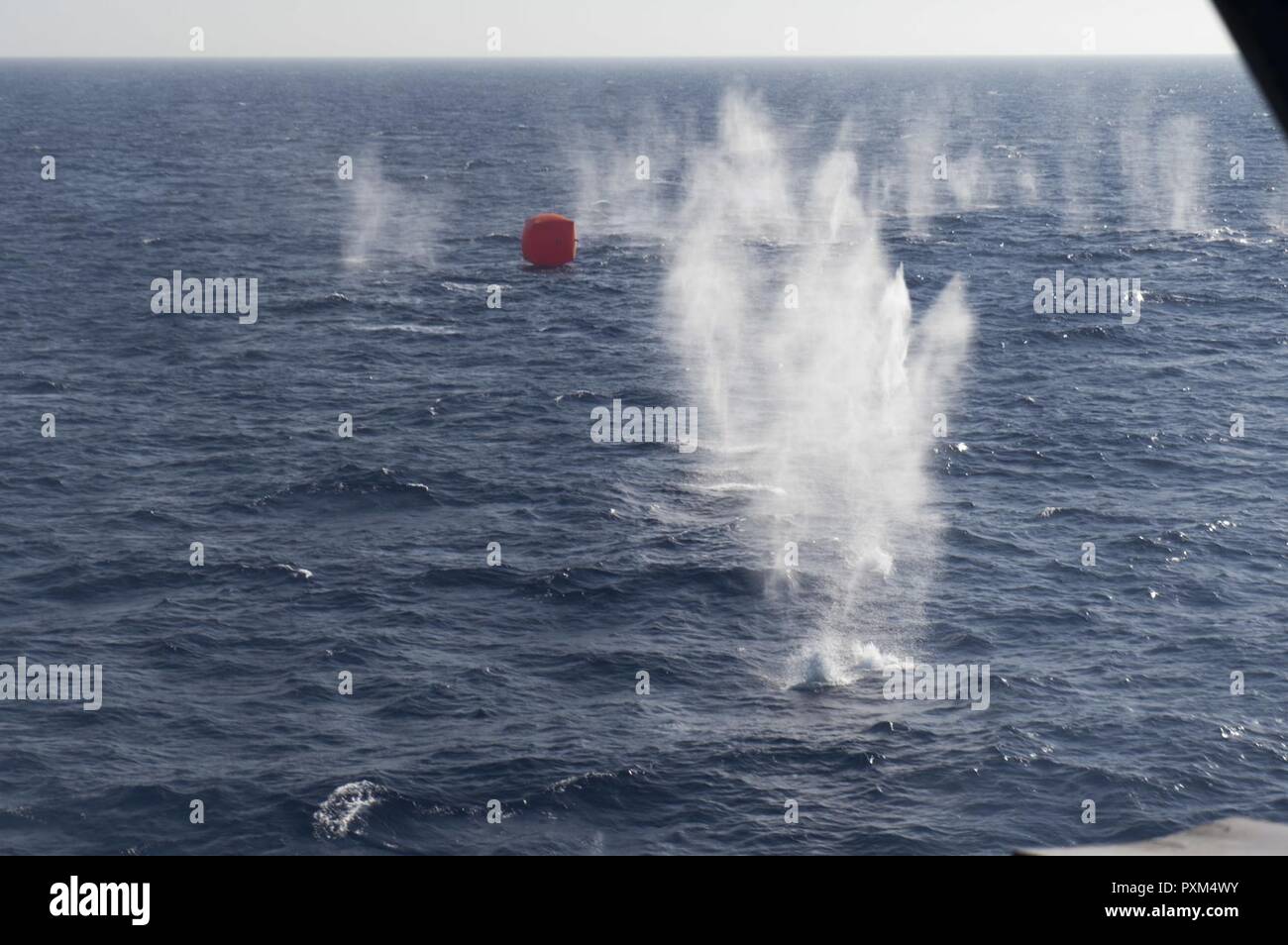 PHILIPPINE SEA (June 11, 2017) Rounds from .50-caliber machine guns ...