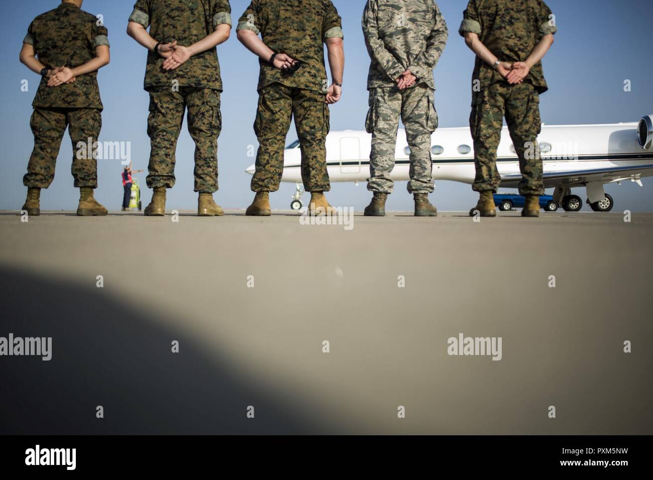 From left to right, 1st Lt. Alexandra R. Bello, public affairs officer ...
