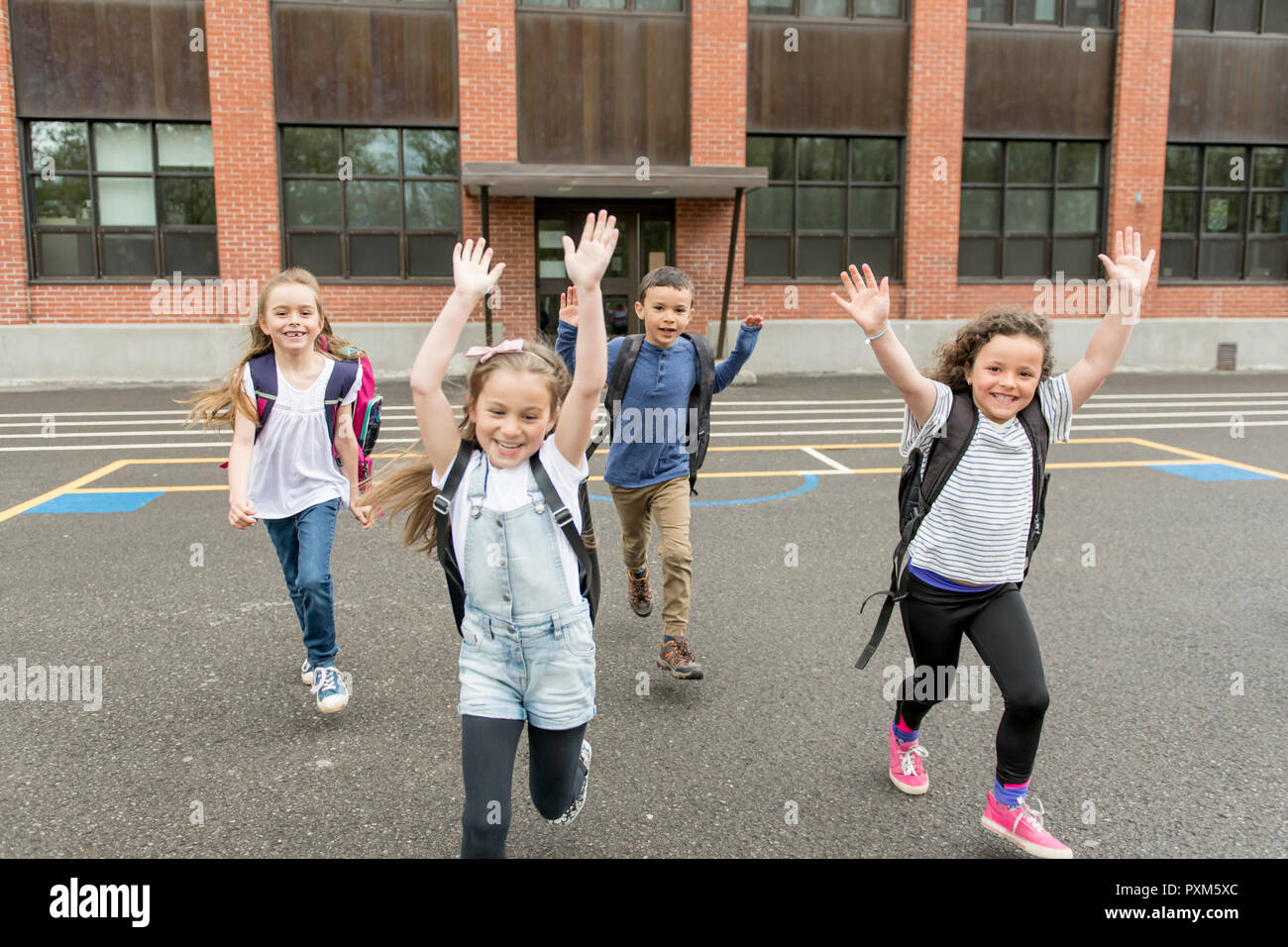 Group of students outside at school standing together Stock Photo - Alamy