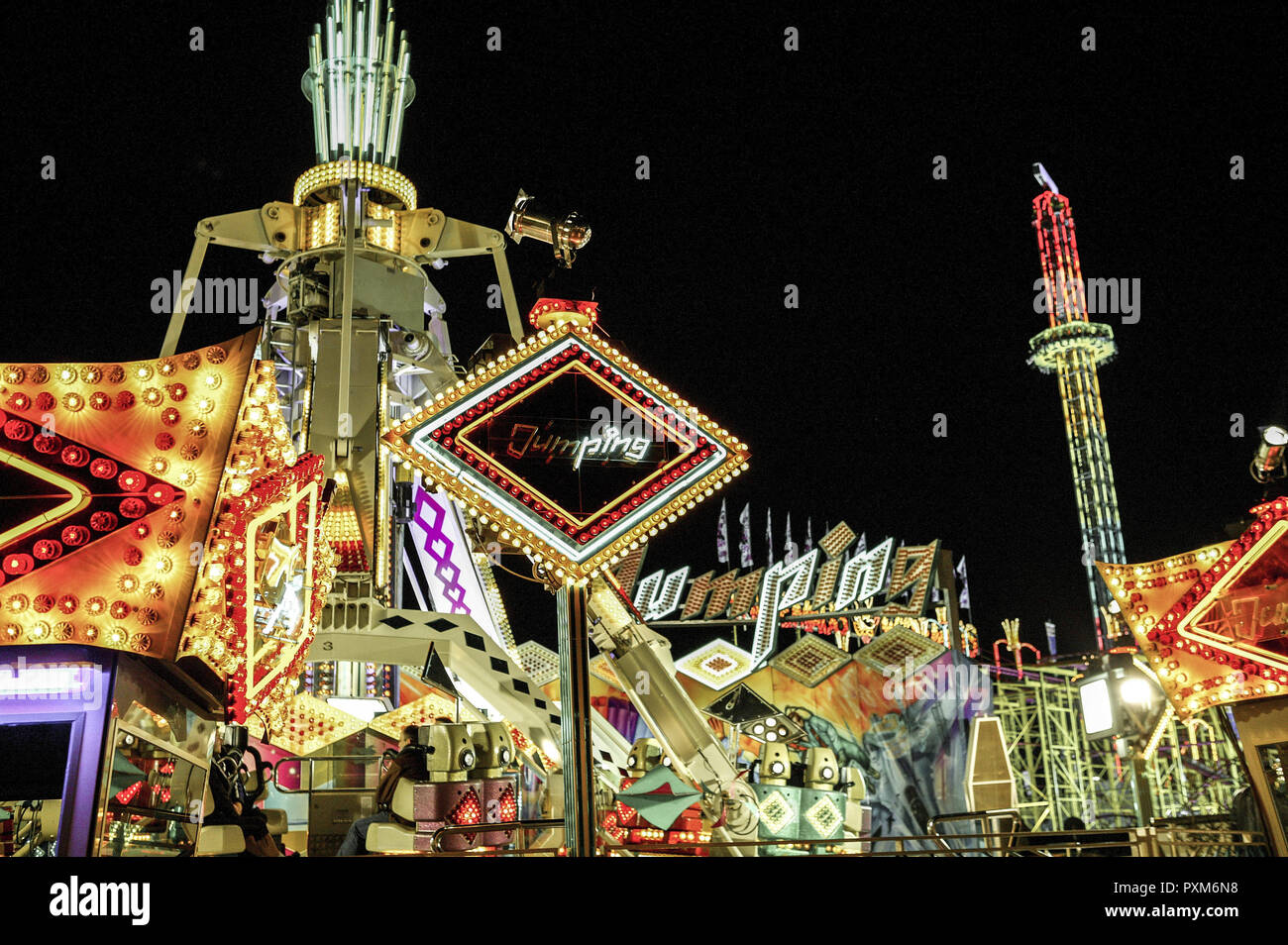 Oktoberfest in Munich at night Stock Photo - Alamy