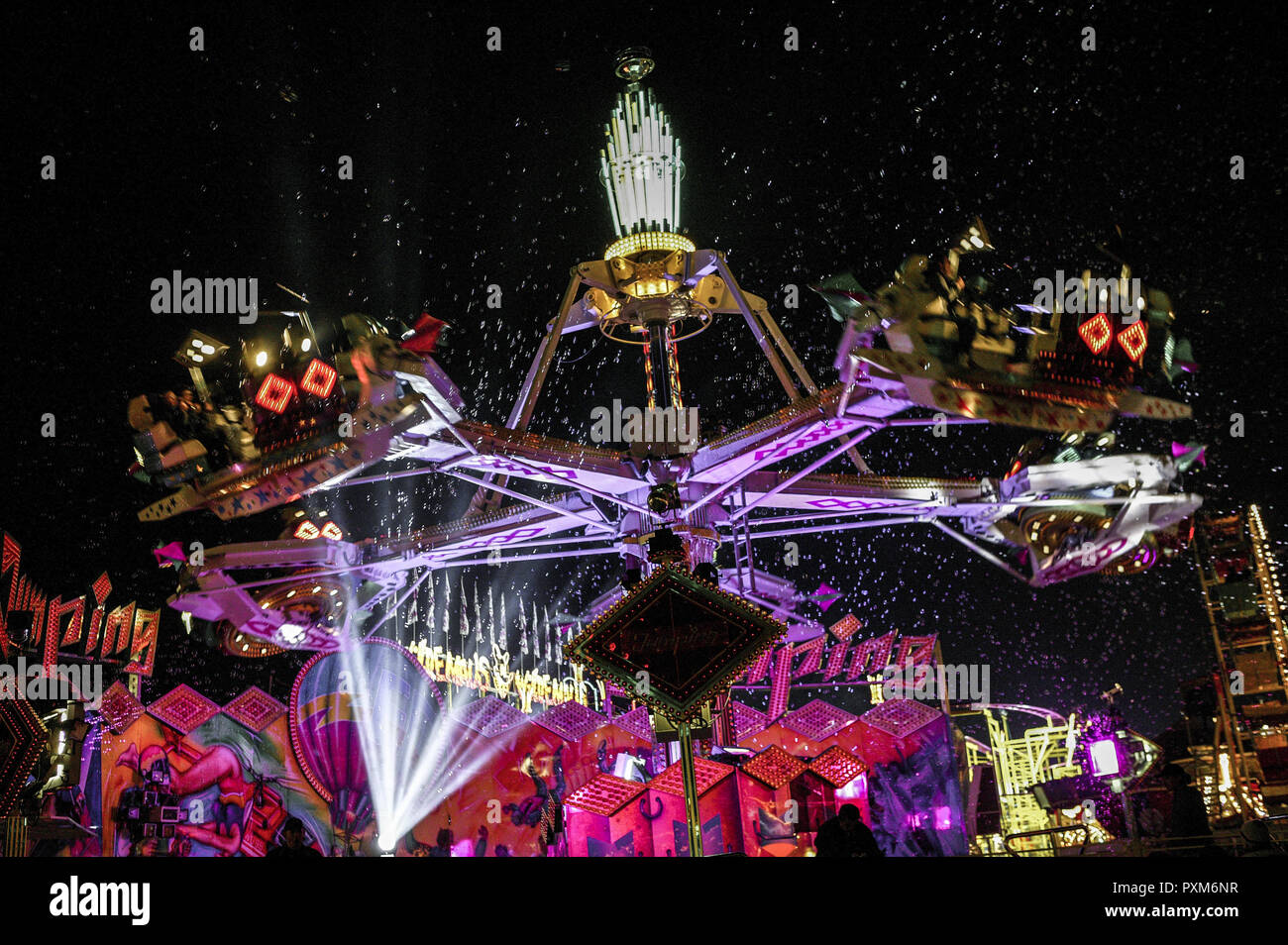 Oktoberfest in Munich at night Stock Photo - Alamy