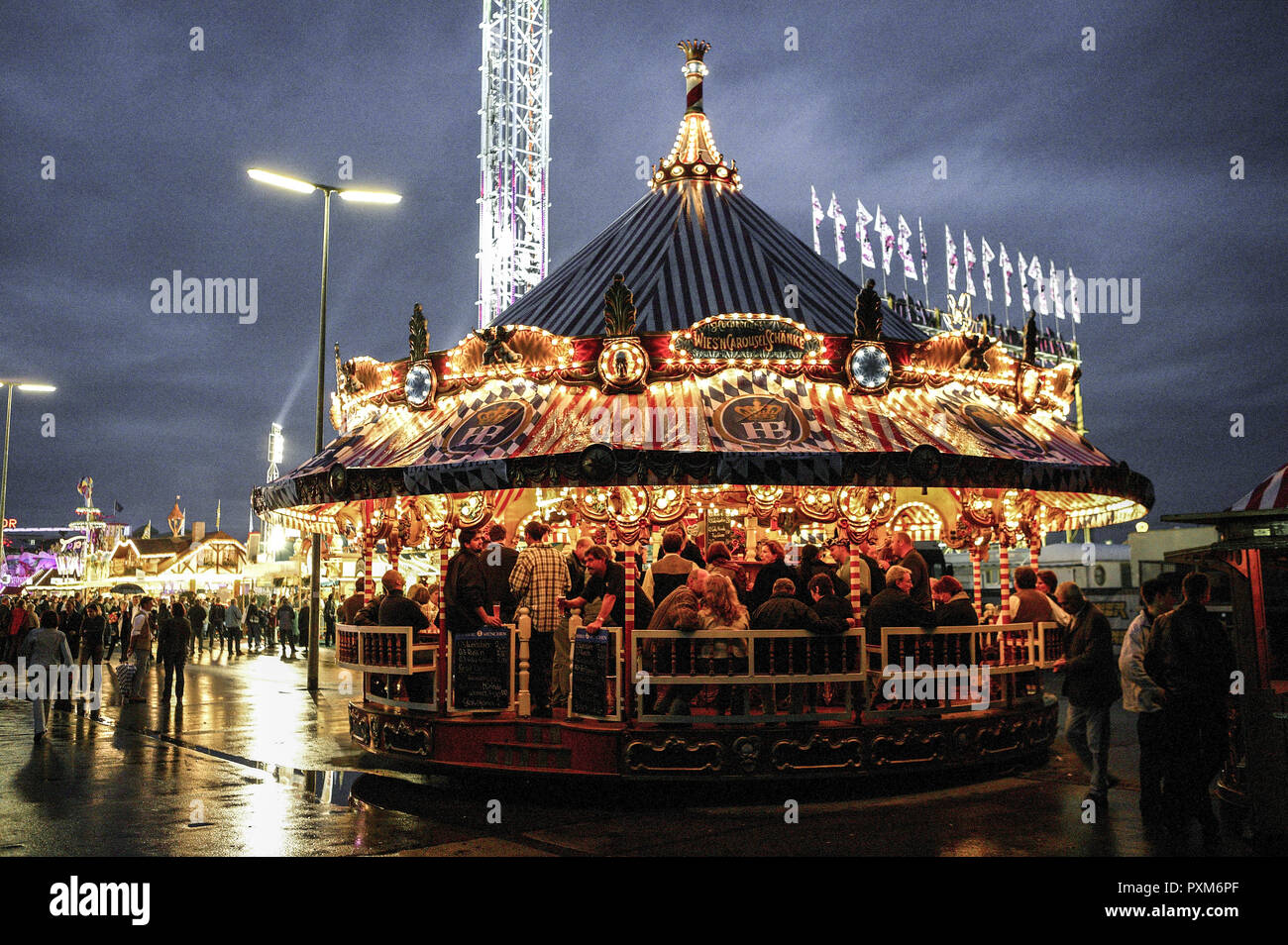 Oktoberfest in Munich at night Stock Photo - Alamy