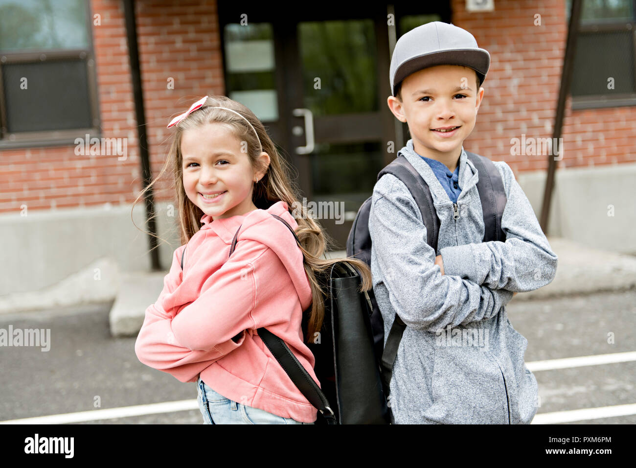 A group of Two students outside at school standing together Stock Photo ...