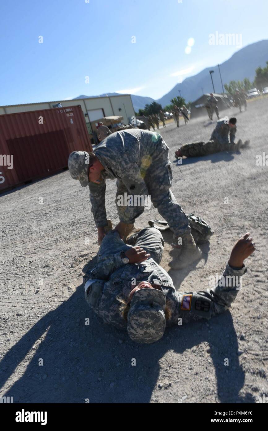 A U.S. Army Reservist with the 96th Sustainment Brigade inspects a ...