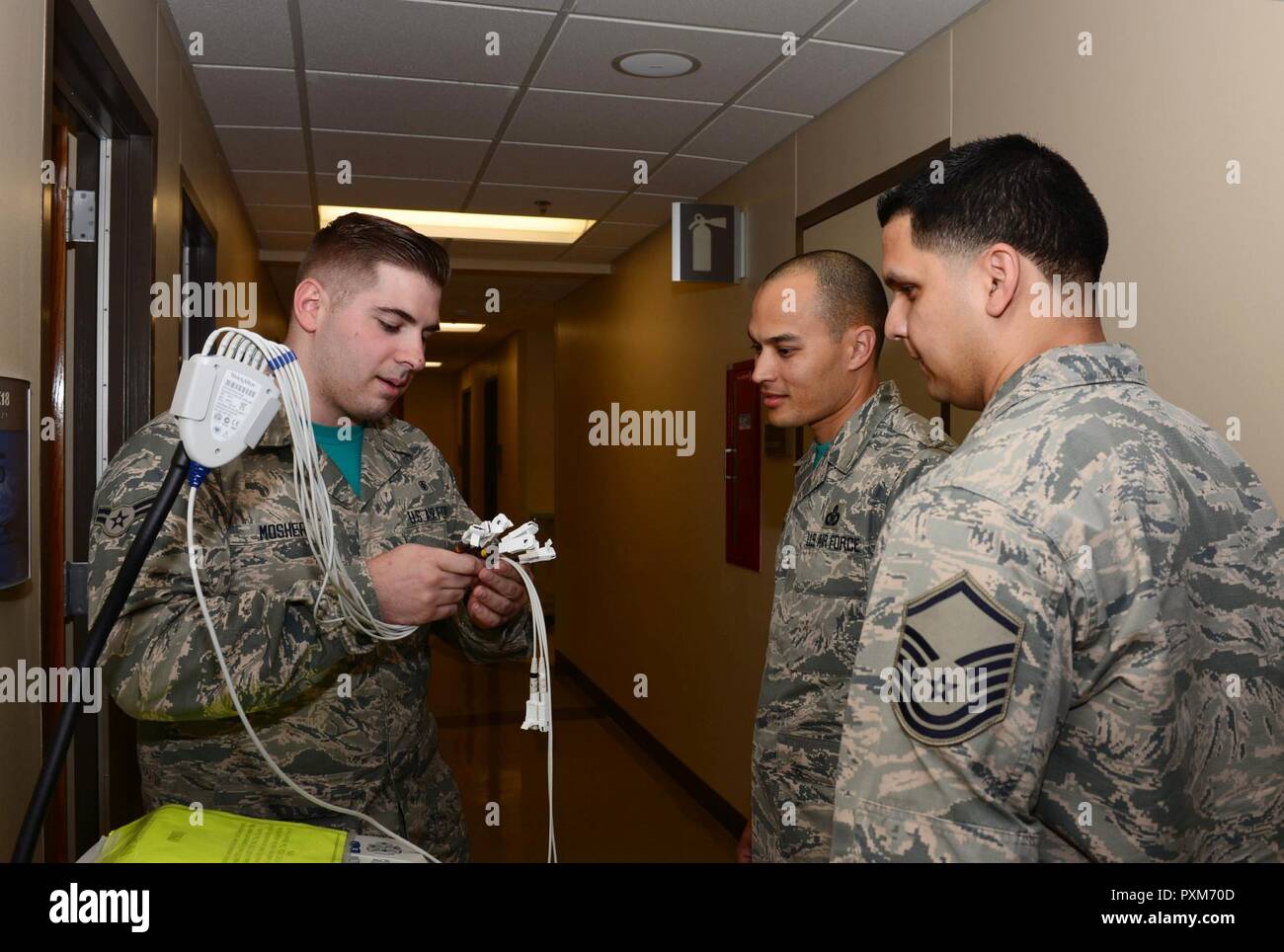 Airman 1st Class Dylan Mosher, an aerospace medical technician assigned ...