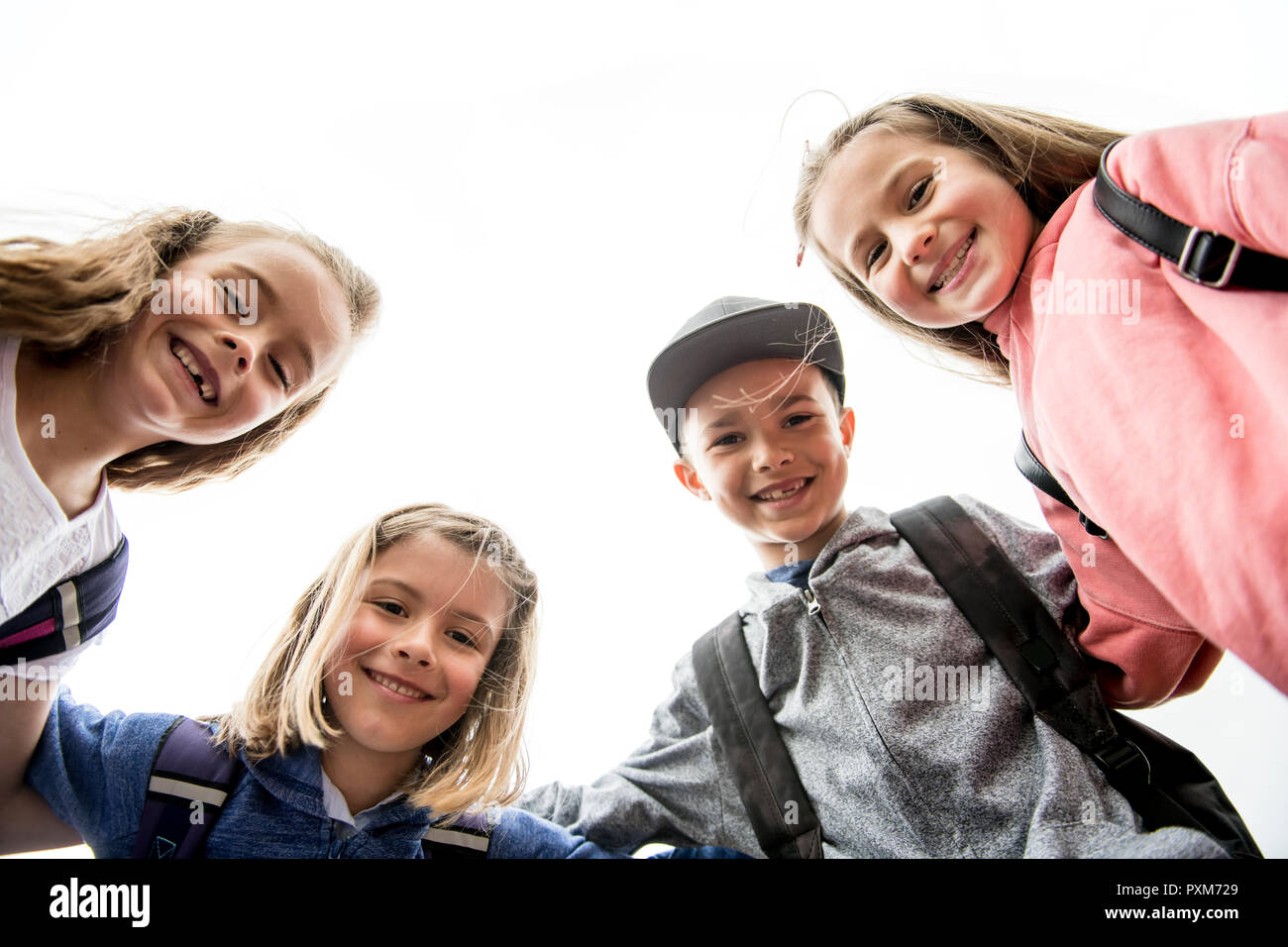 Group of students outside at school standing together Stock Photo - Alamy