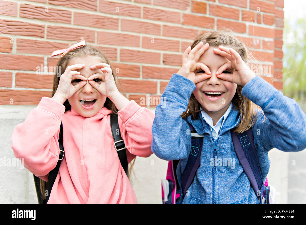 A group of Two students outside at school standing together Stock Photo ...