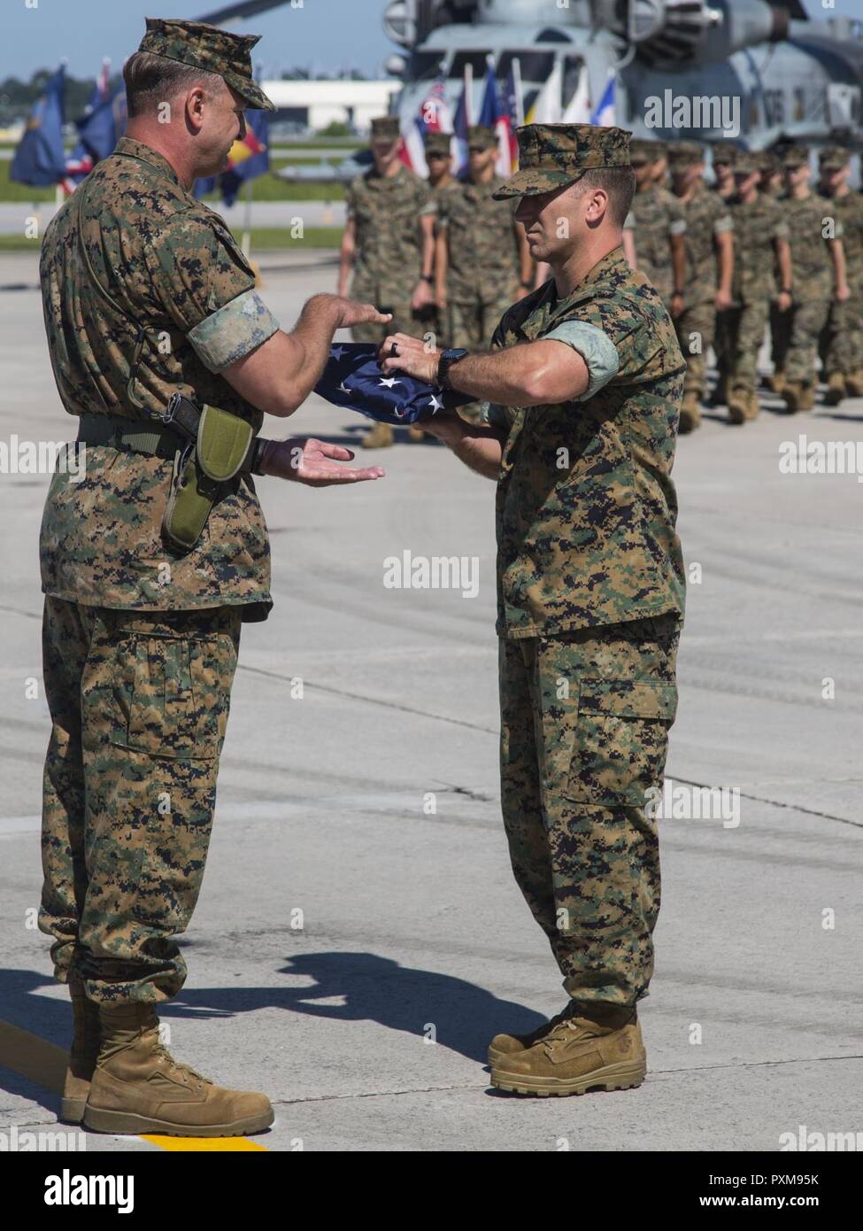 U.S. Marine Corps Lt. Col. Christian M. Ward, left, former commanding ...