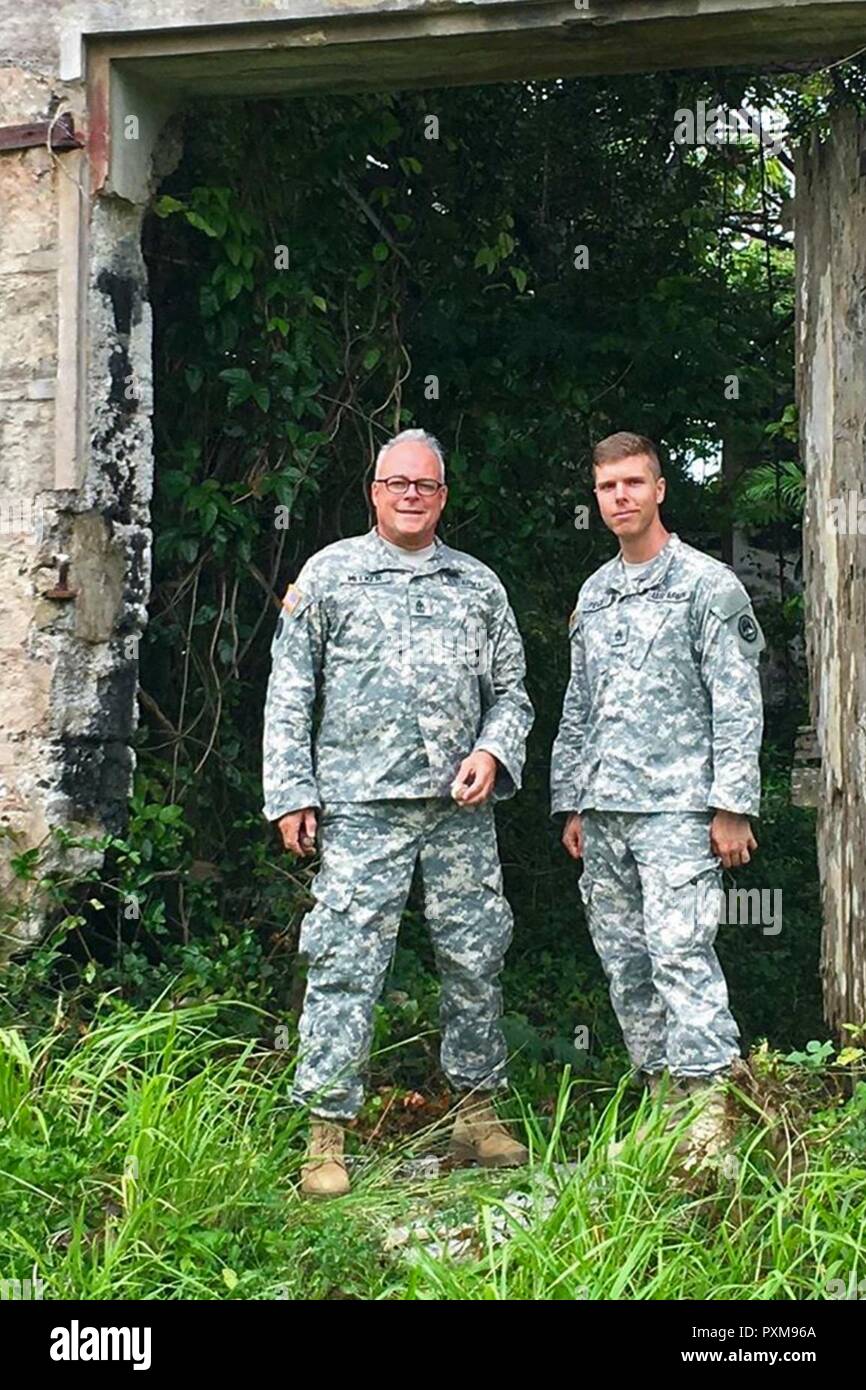 Louisiana National Guardsmen 1st Sgt. Paul Meeker (left) and Staff Sgt ...